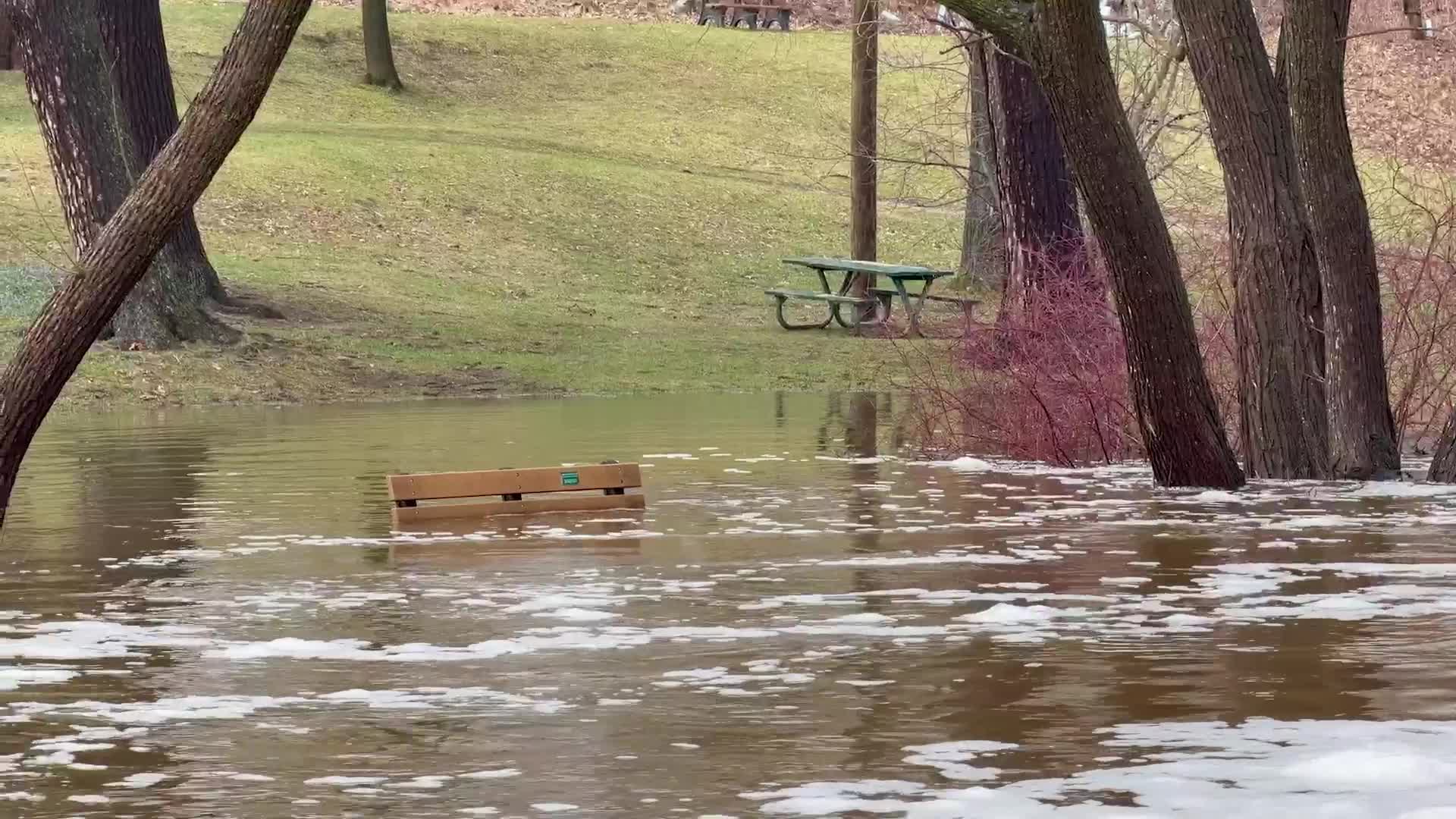 Water levels begin to recede in Traverse City as regional closures ...