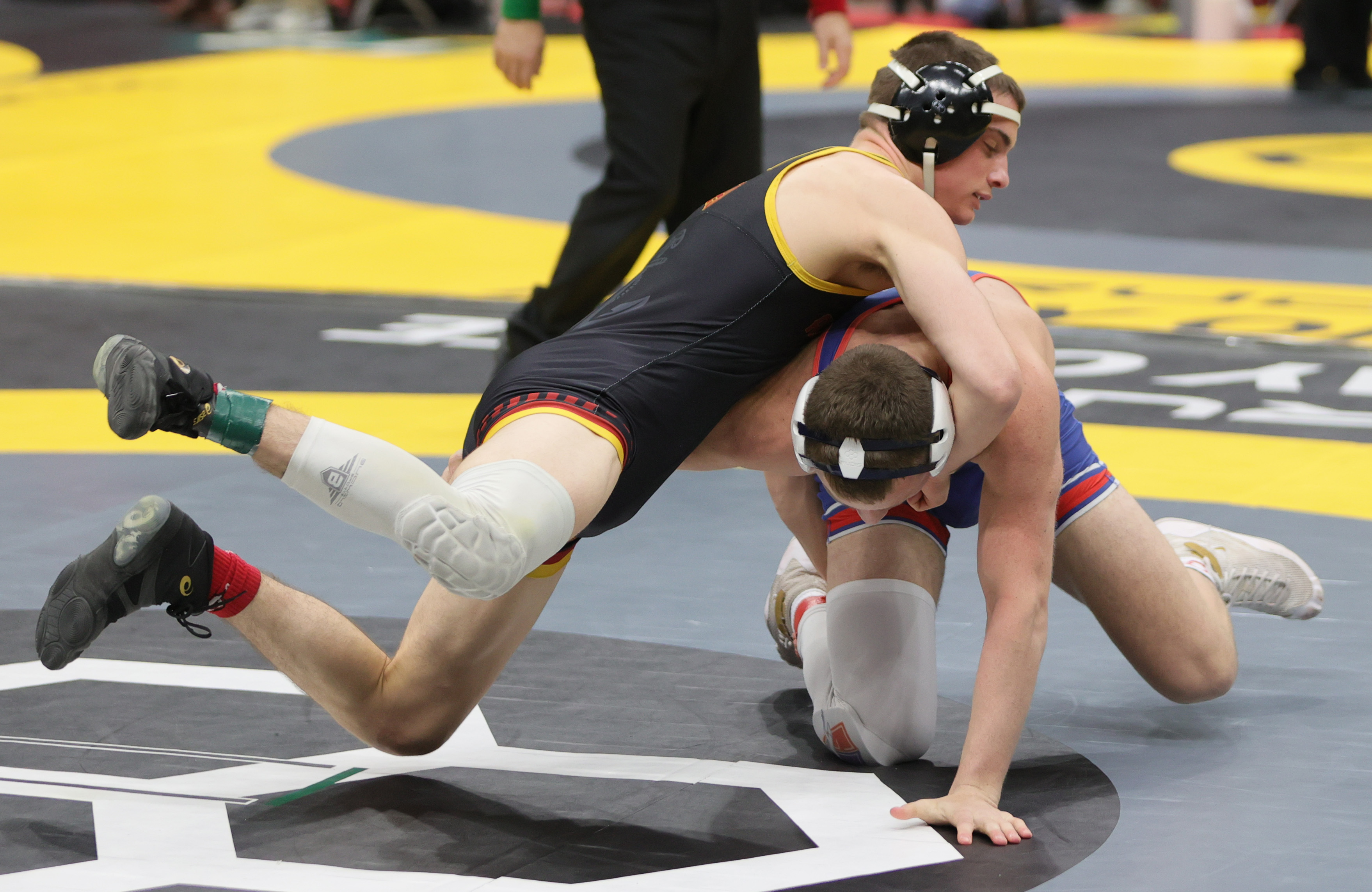 D1 state high school wrestling tournament, round one, March 10, 2023 ...