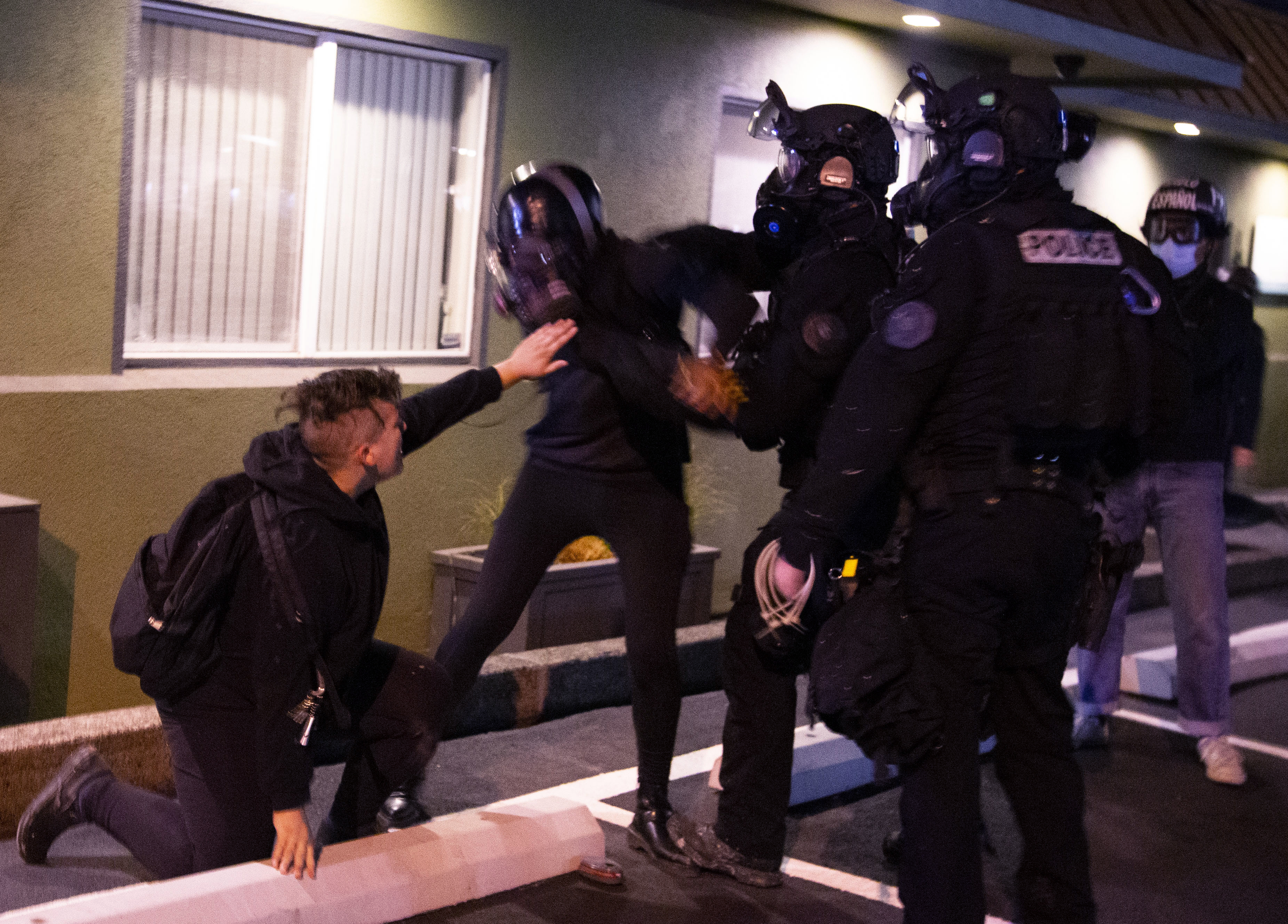 Riot declared as fire set outside Portland police union headquarters ...
