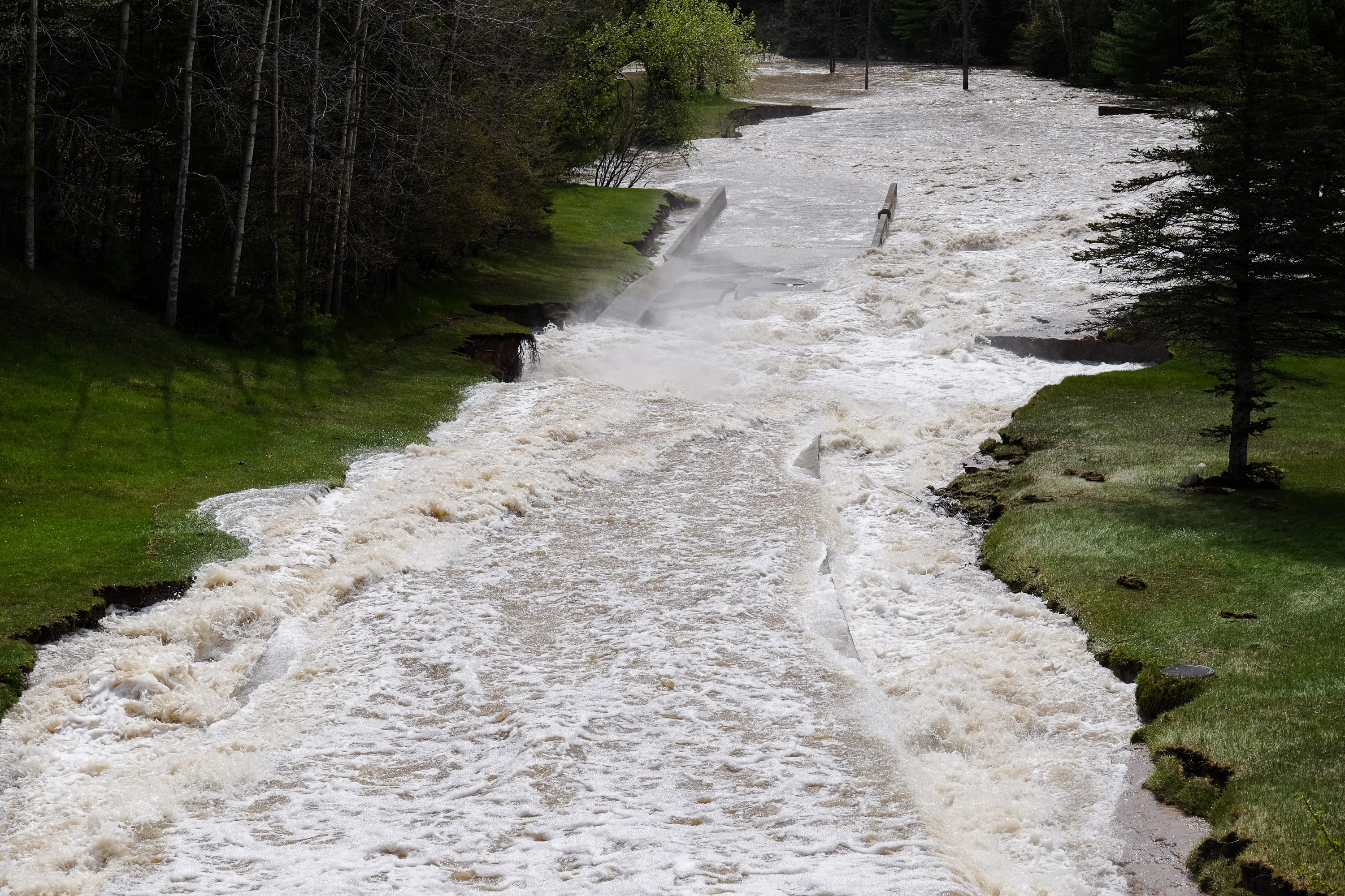 Heavy rains cause Forest Lake dam spillway to overflow - mlive.com