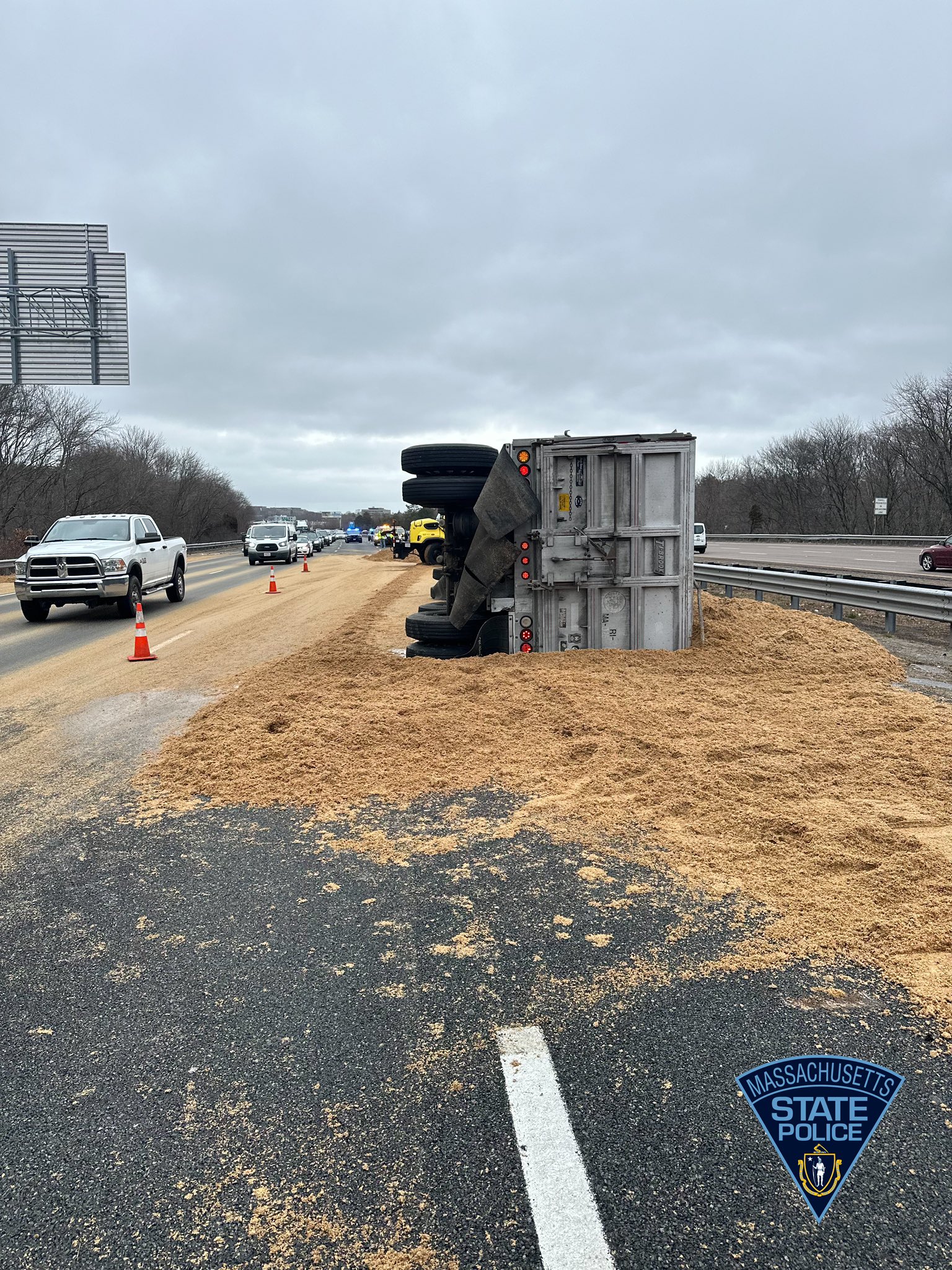 Sand spill after tractor-trailer rollover shuts down part of I-93 in ...