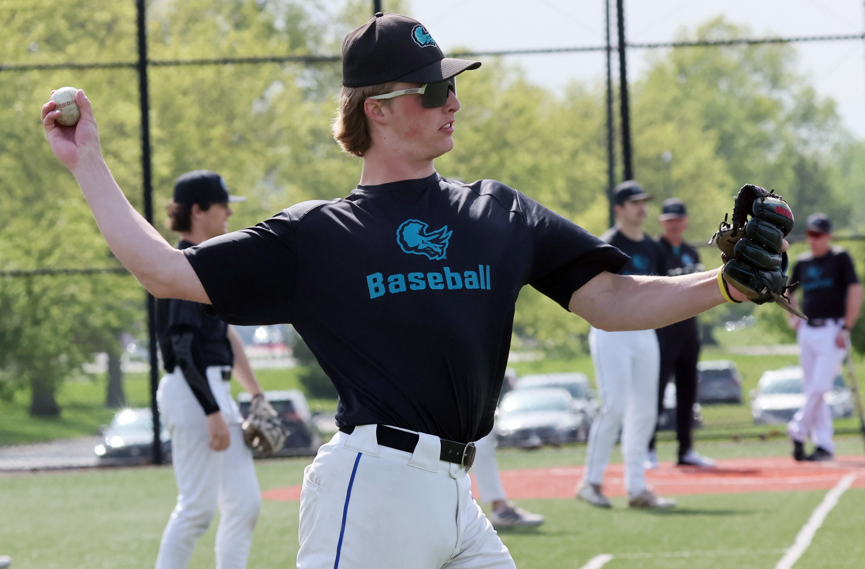 The Tri-C Triceratops baseball team practices before the start of their division playoffs ...