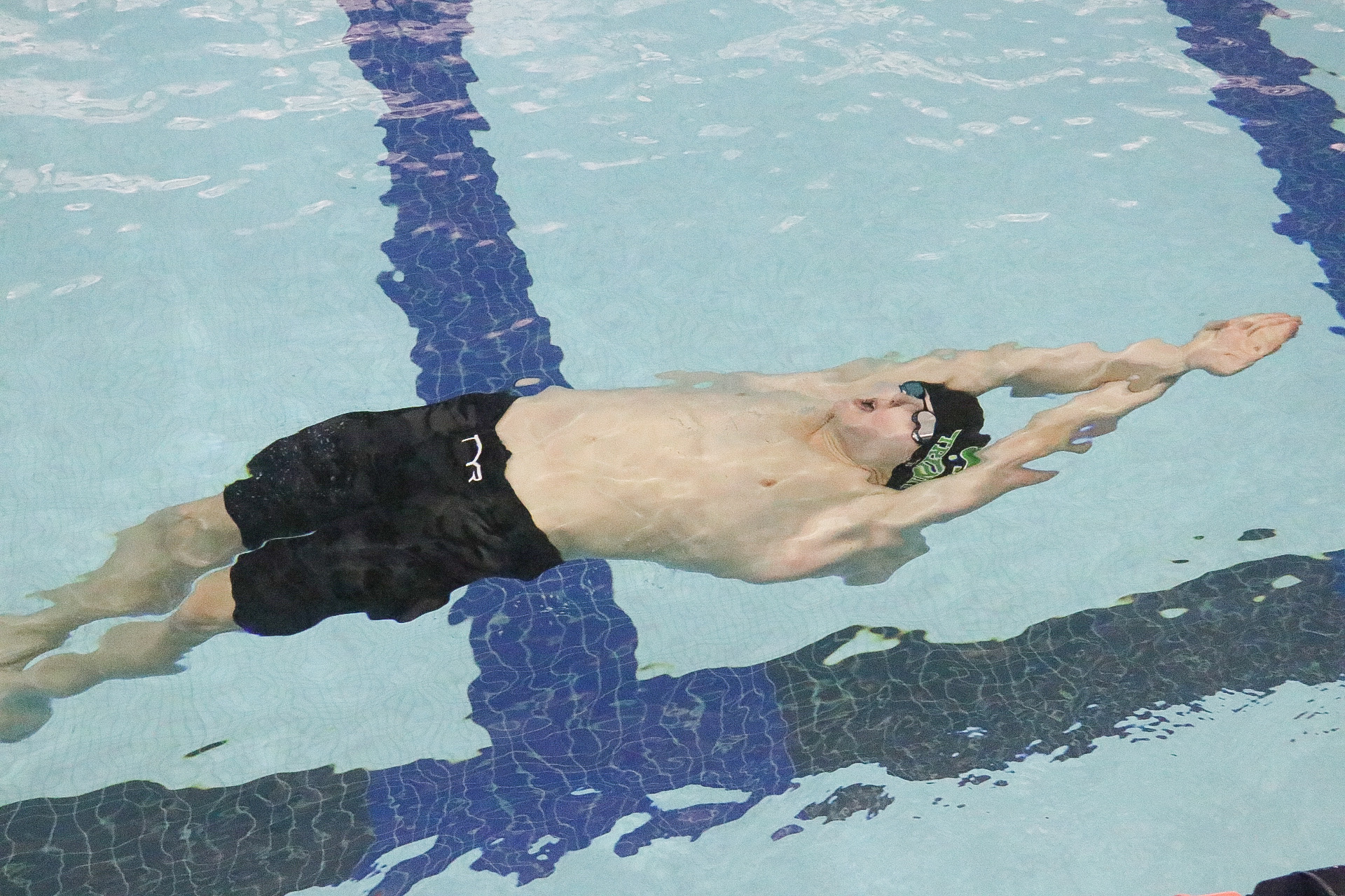 Trinity's boys team competes in the 200 medley relay during the PIAA ...