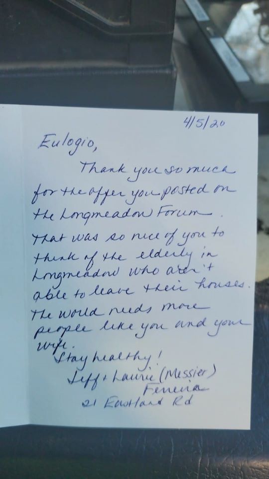 Thank you signs decorate trash cans for worker helping others run ...