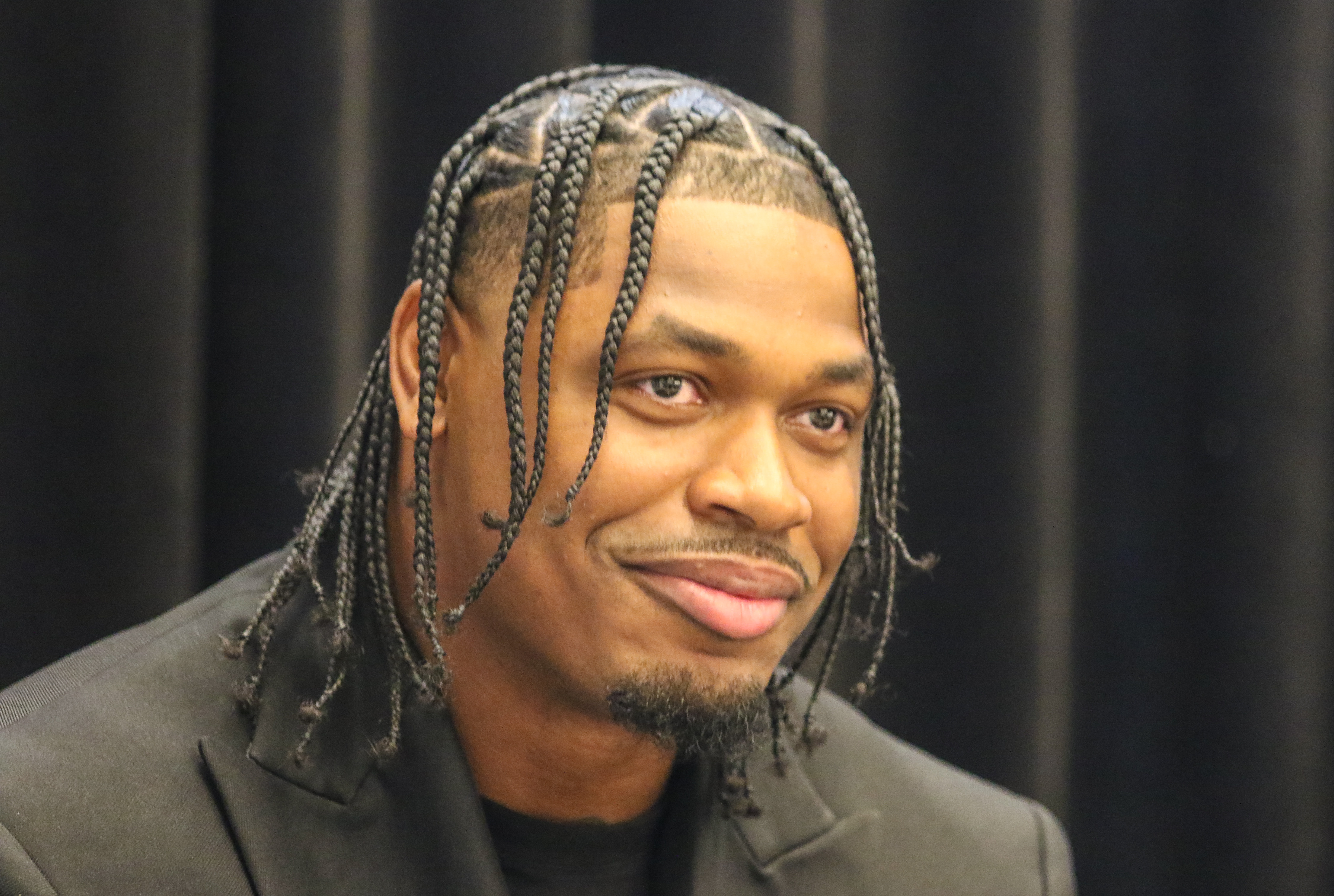 NFL player and Newark native Al-Quadin Muhammad is presented with a key ...