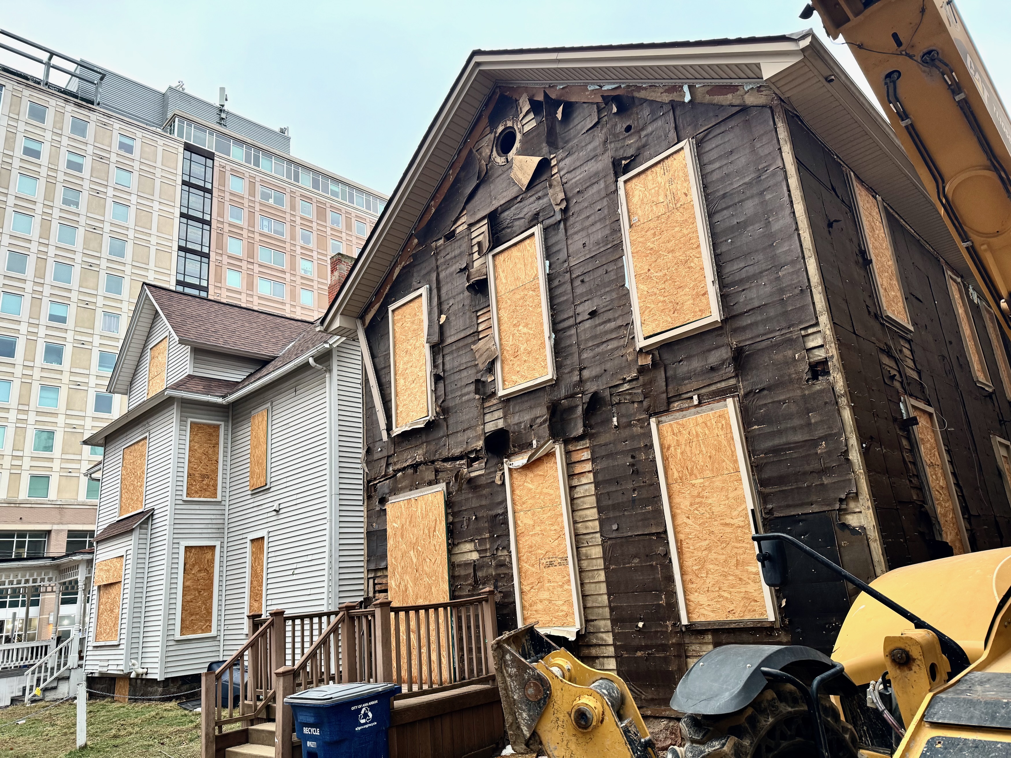 Structures awaiting demolition for 19-story high-rise development in ...