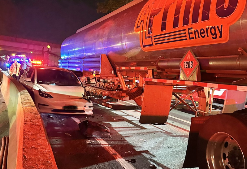 Man pinned between tractor-trailer and barrier rescued, Boston ...