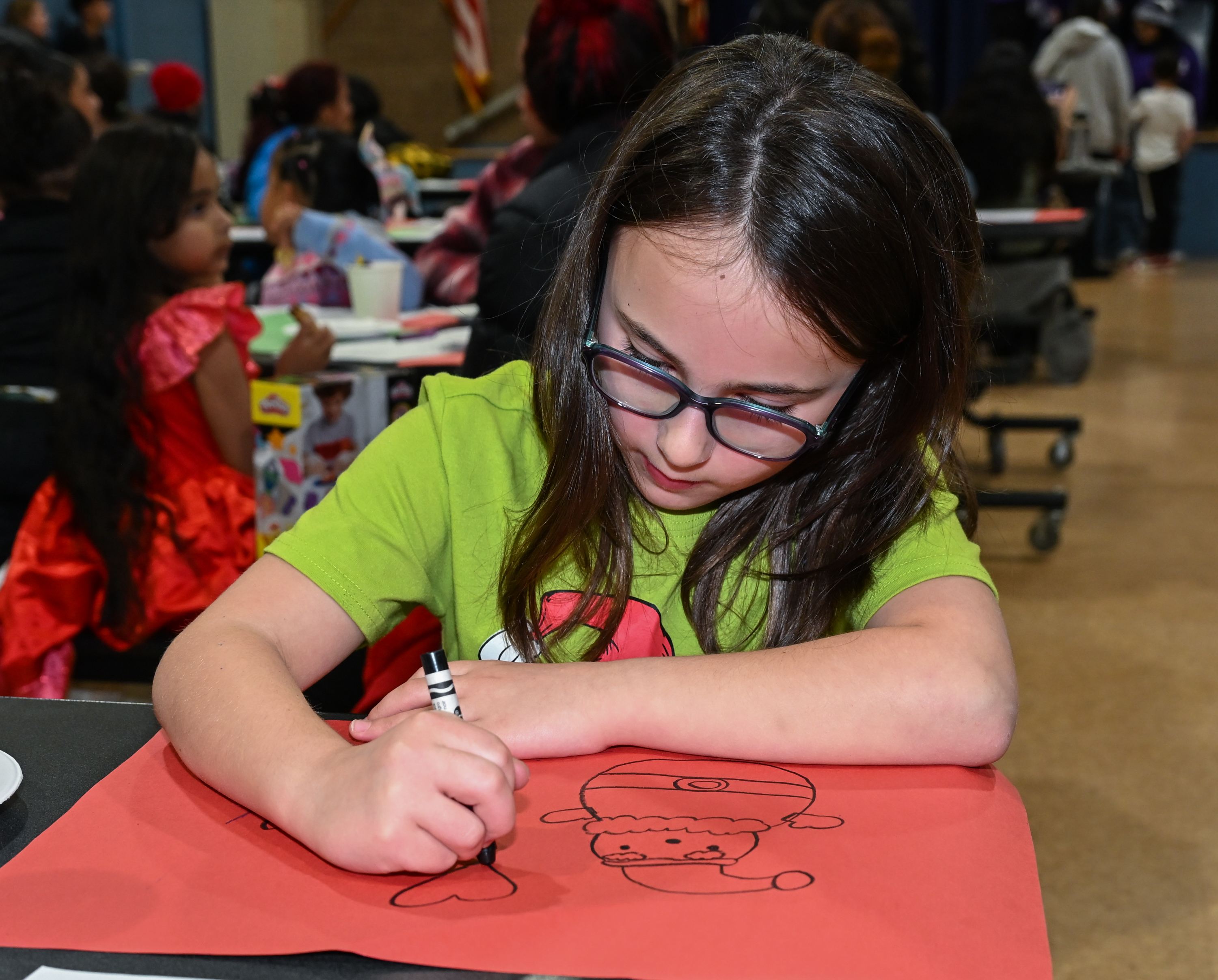 Students, families enjoy Cookies and Cocoa with Santa at Donahue School in Holyoke - masslive.com