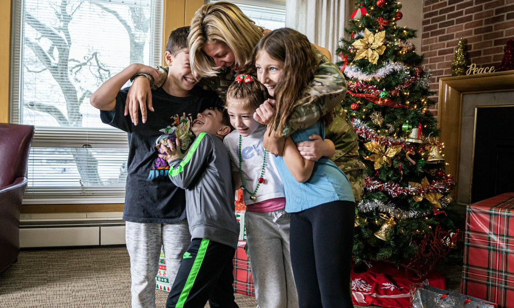 Army mom returns early from deployment surprising kids at school ...