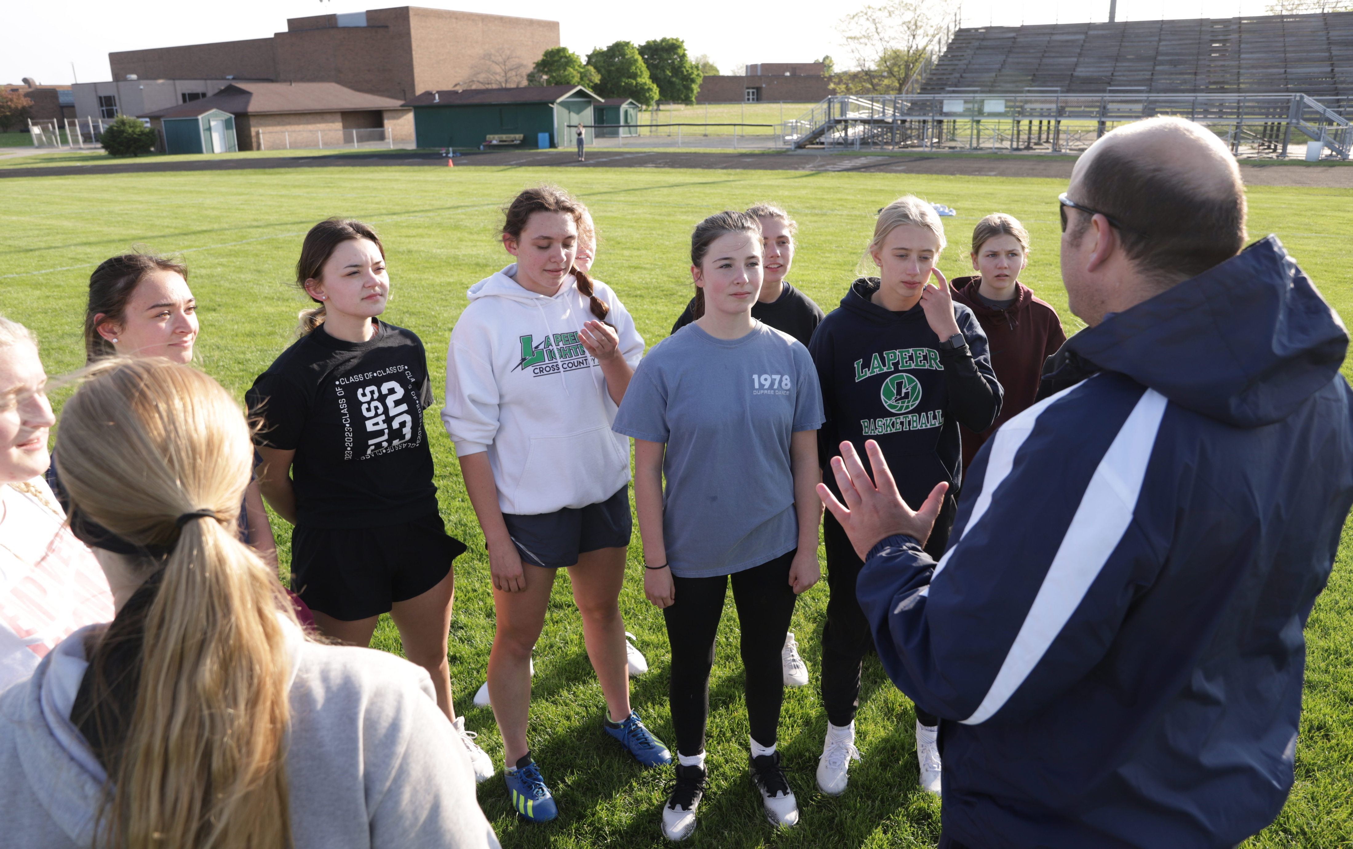 Lapeer high school girls participate in flag football pilot league ...