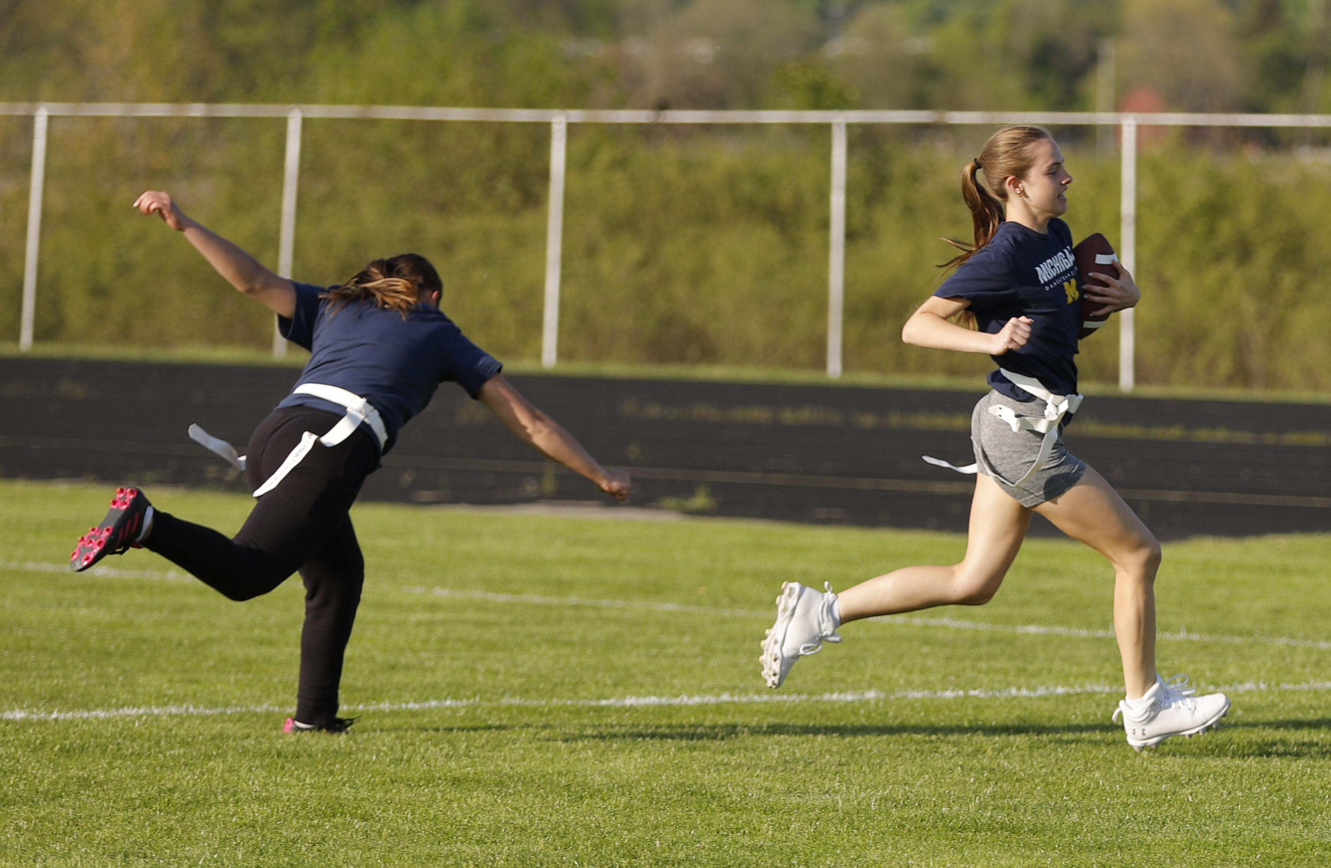 Lapeer high school girls participate in flag football pilot league ...