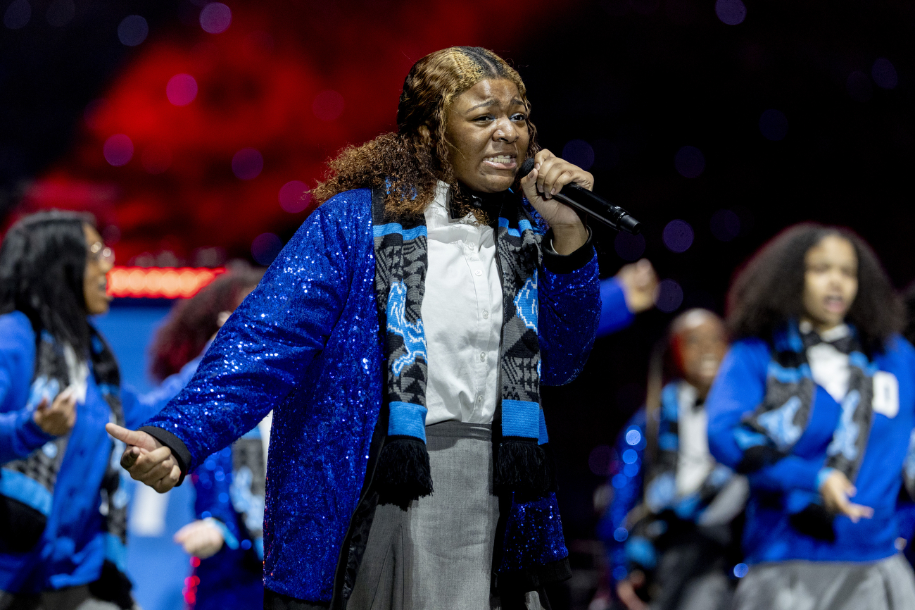 Detroit Youth Choir performs at halftime of Lions' first playoff win in ...