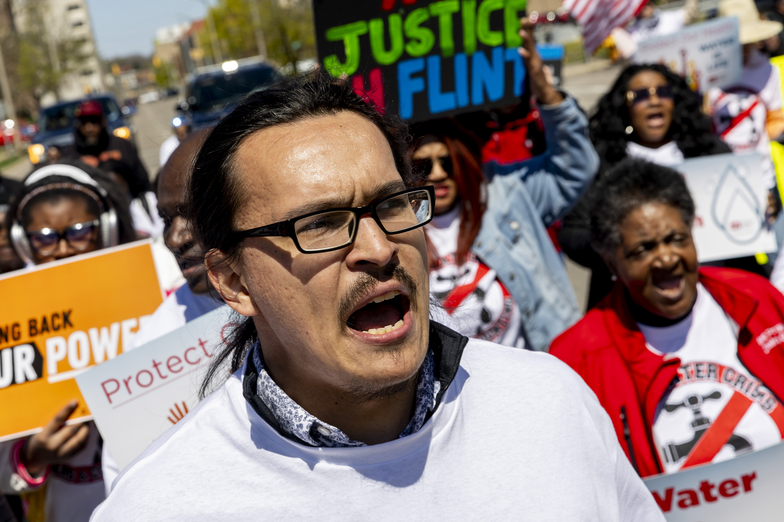 Protesters march on Flint water crisis 10-year anniversary - mlive.com