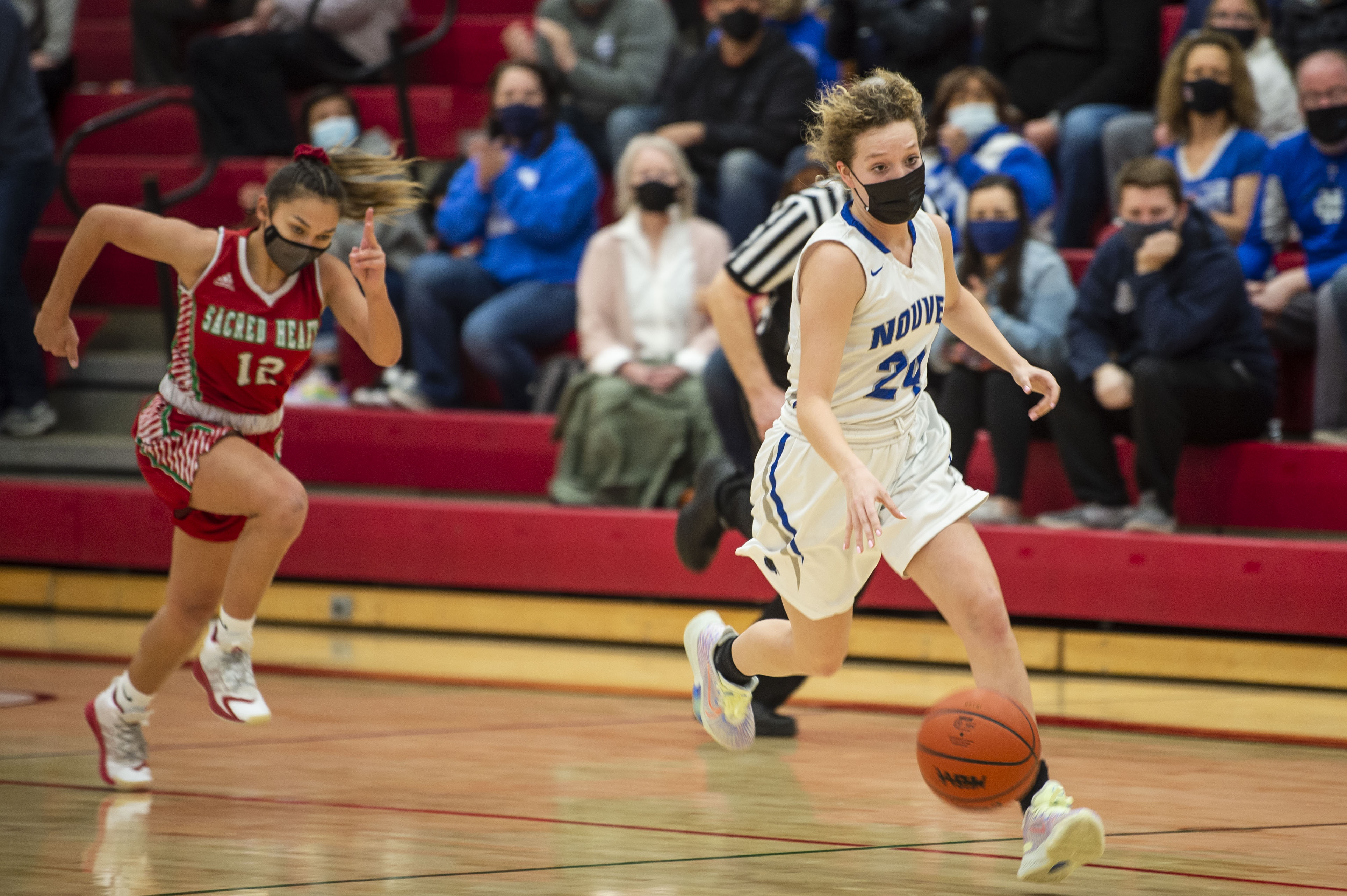 Nouvel girls basketball claims district championship trophy - mlive.com