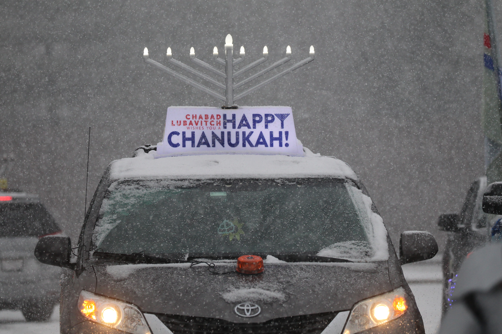 Menorah-topped cars parade through Cleveland eastern suburbs ...