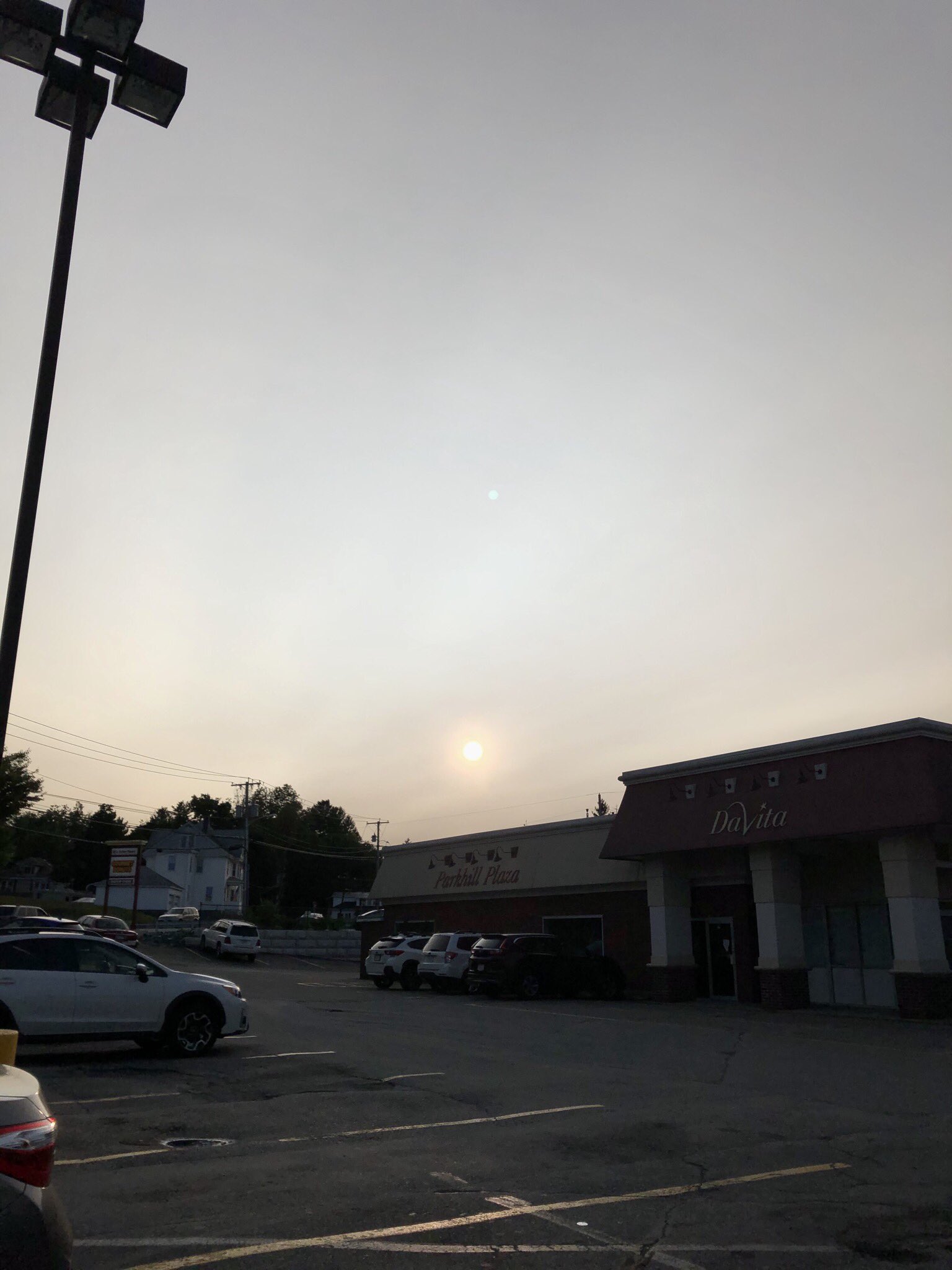 See shots of Tuesday's hazy sky in Massachusetts caused by wildfires ...
