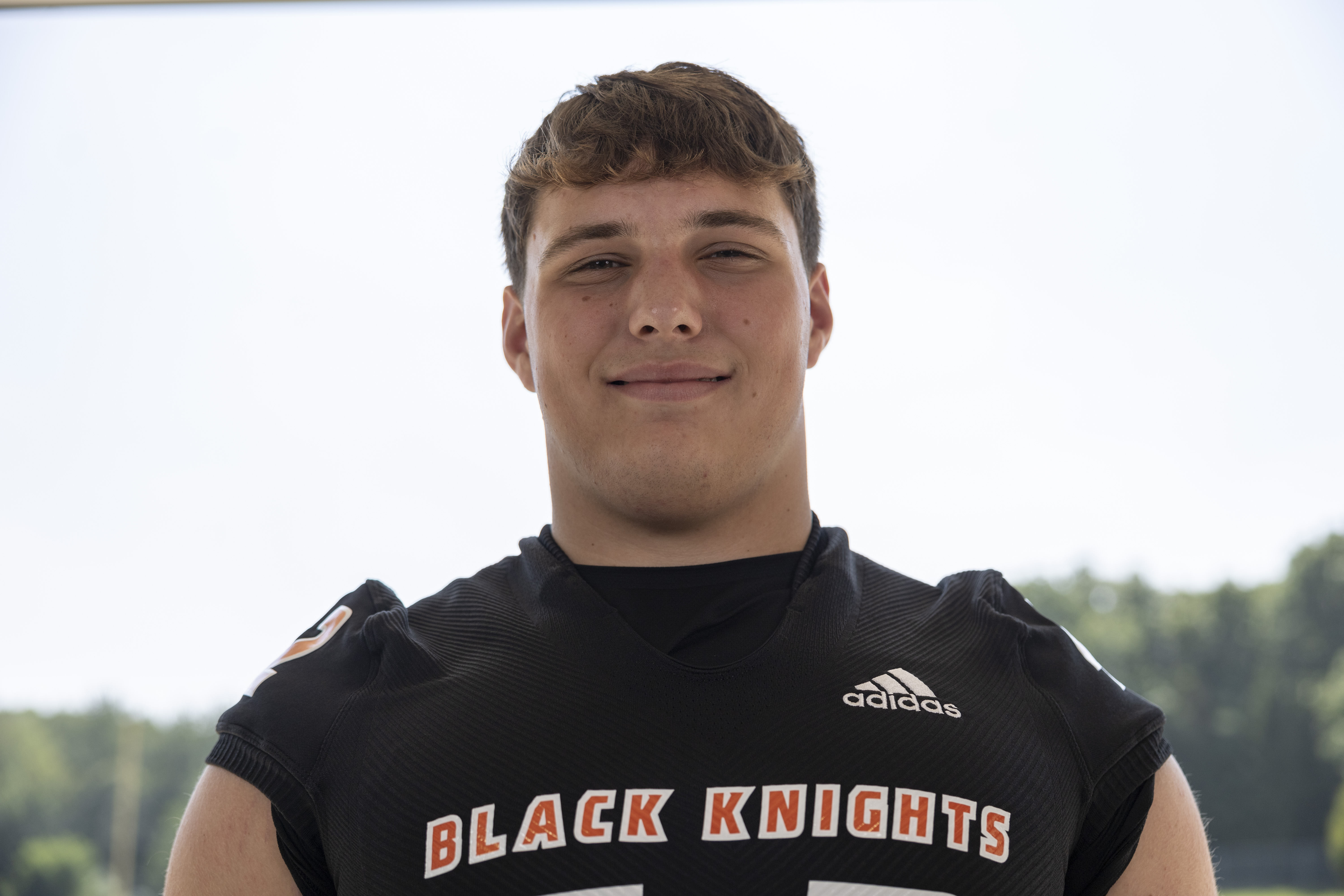 Black High School Football Player