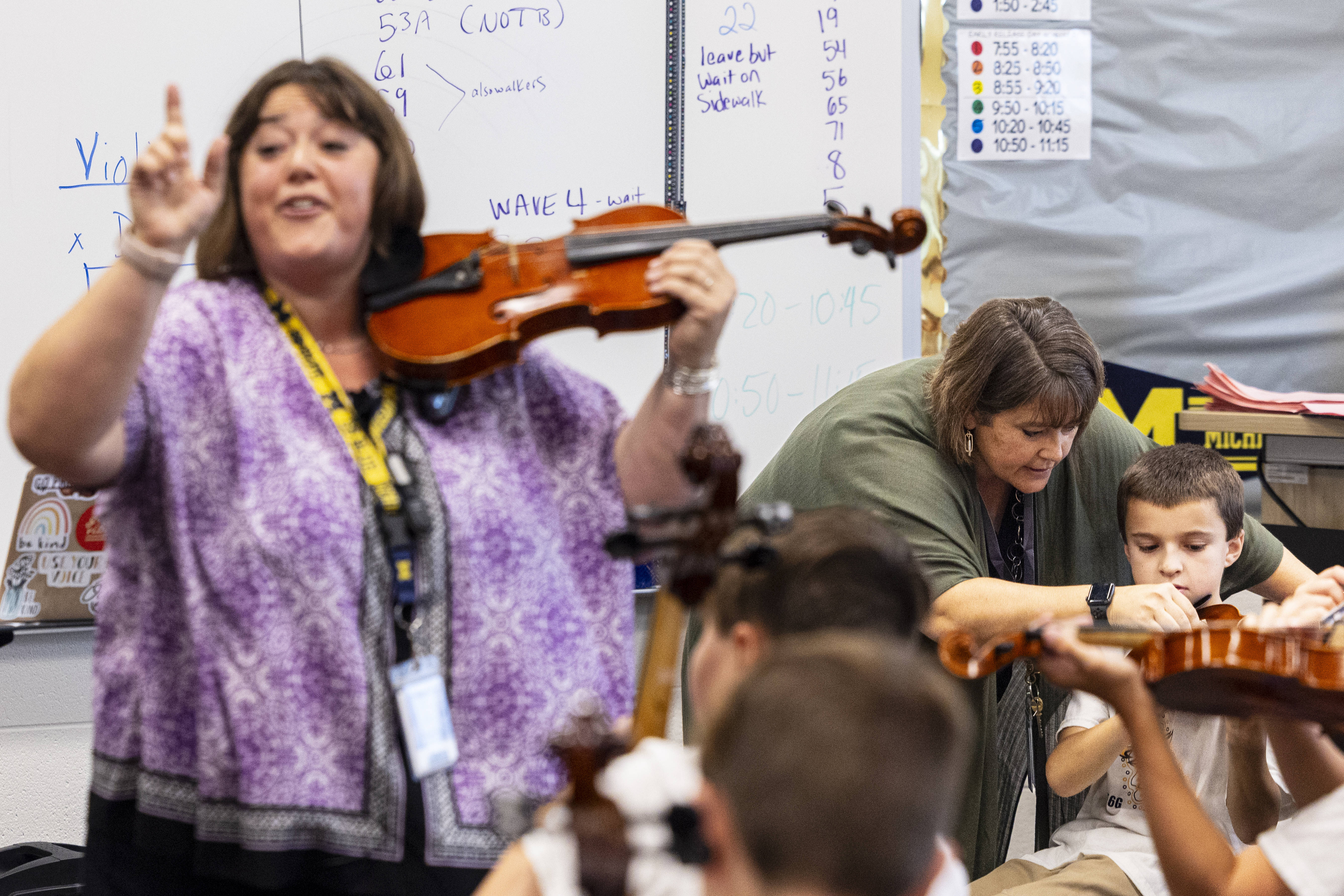 Identical twin sisters teach orchestra at Hudsonville Public Schools ...