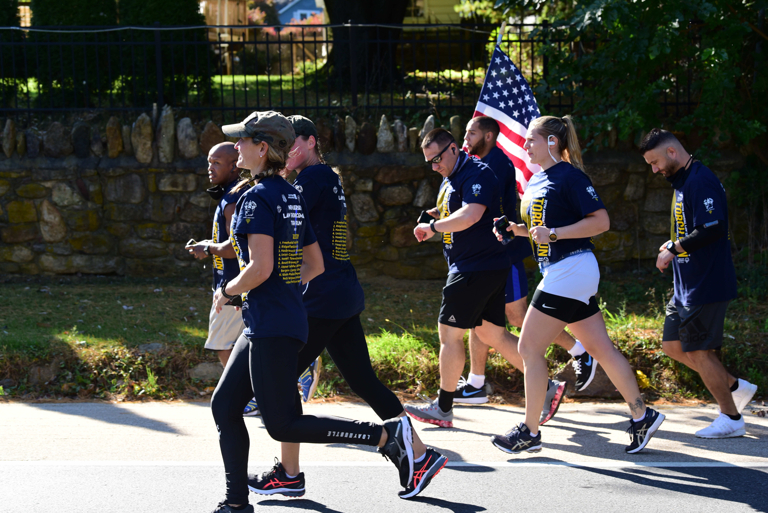 Warren County police hit the streets in Torch Run to benefit Special ...