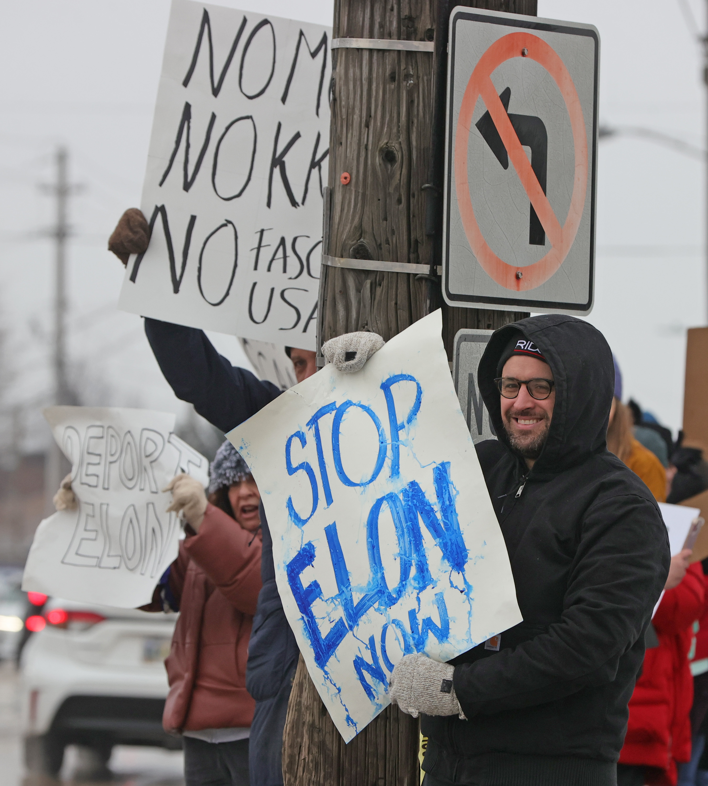 Rally at Tesla Motors Cleveland in Lyndhurst in protest of Elon Musk’s ...