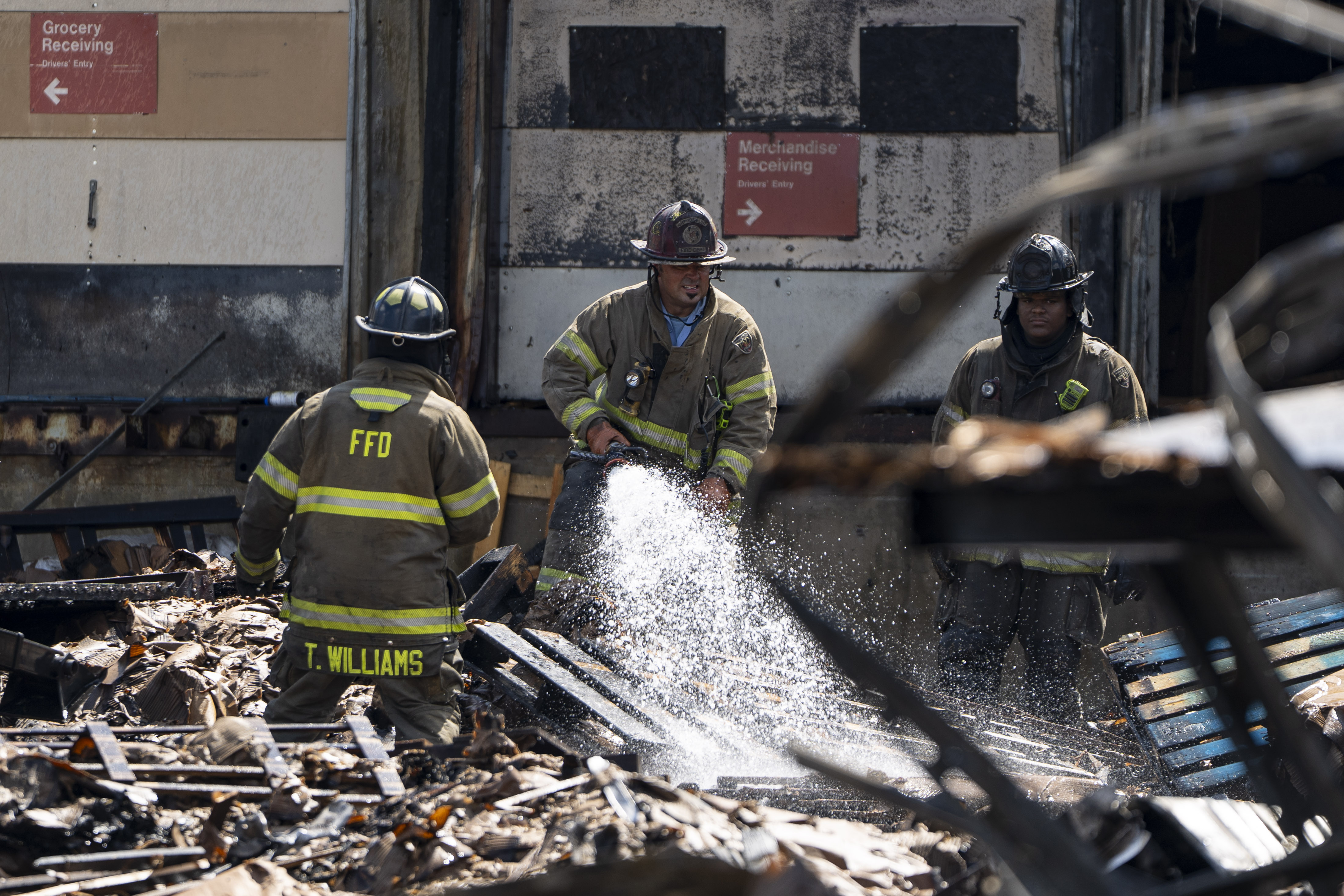 Firefighters work to extinguish a fire at D.I. Enterprises - mlive.com
