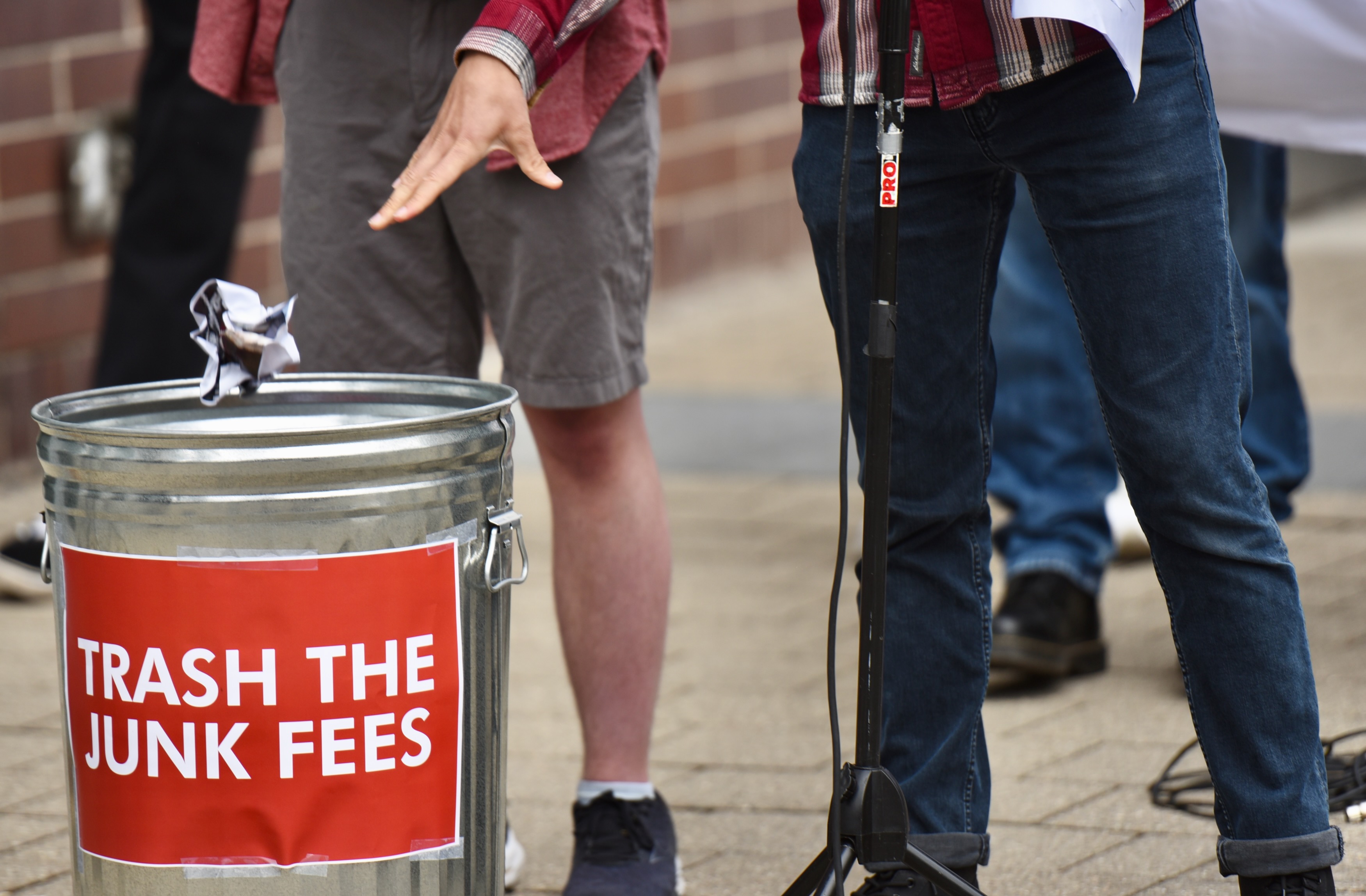 Protest against rental 'junk fees' charged by Ann Arbor landlords ...