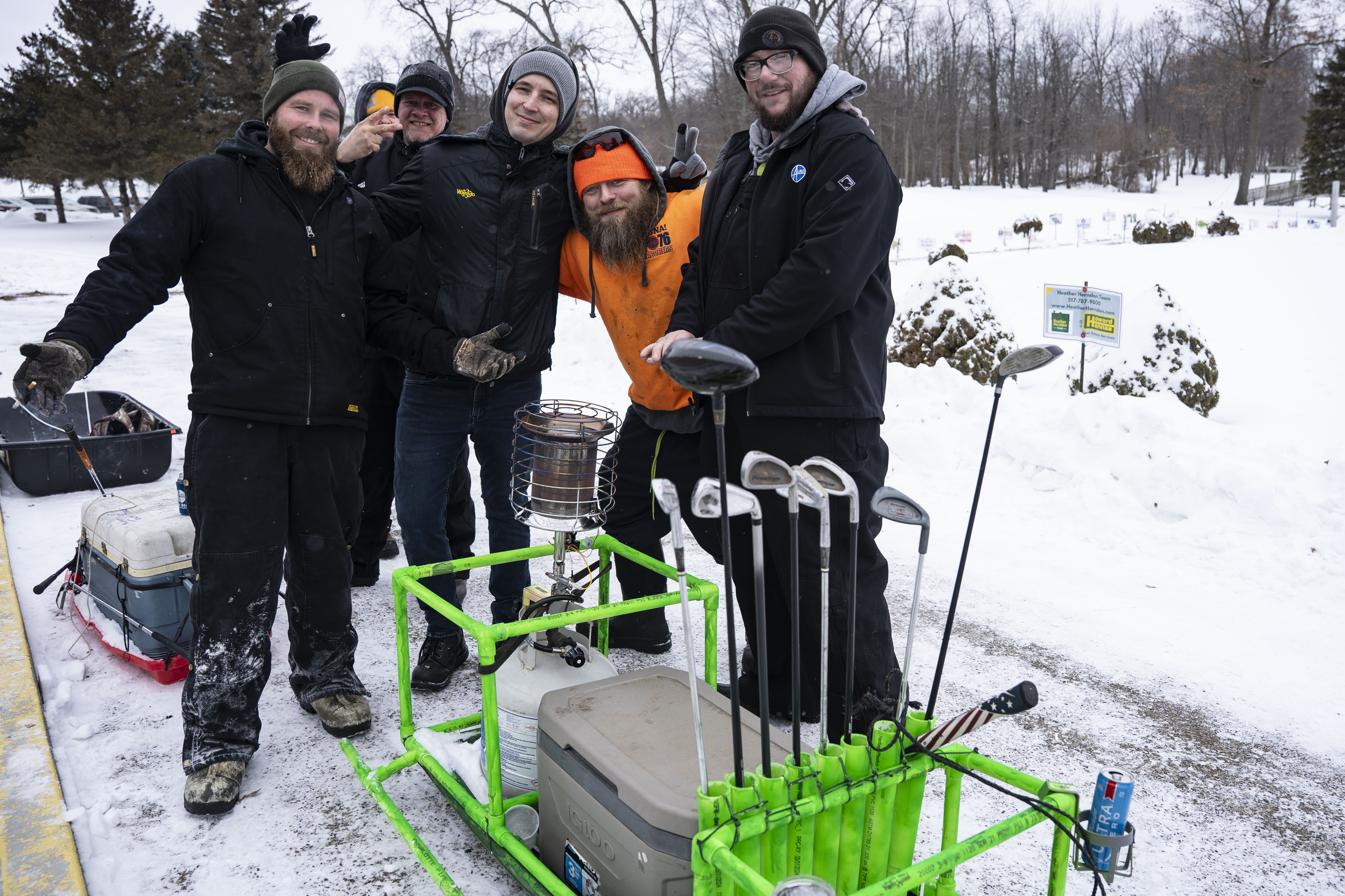 Golfers play through the snow at the annual Kiwanis Chili Golf Classic ...