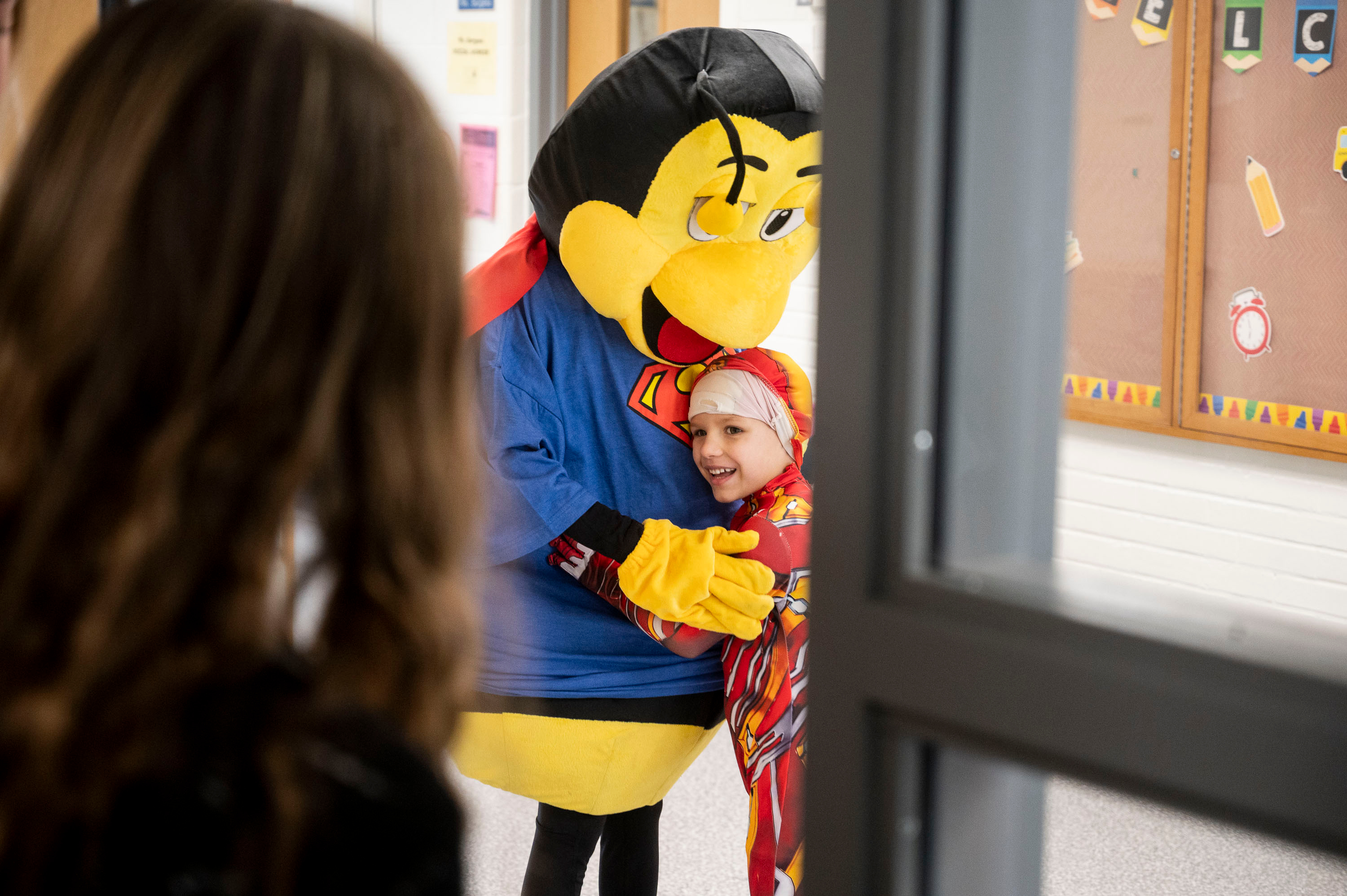 5-year-old Grayson Johnson brings superhero outfits, enthusiasm to C.S ...