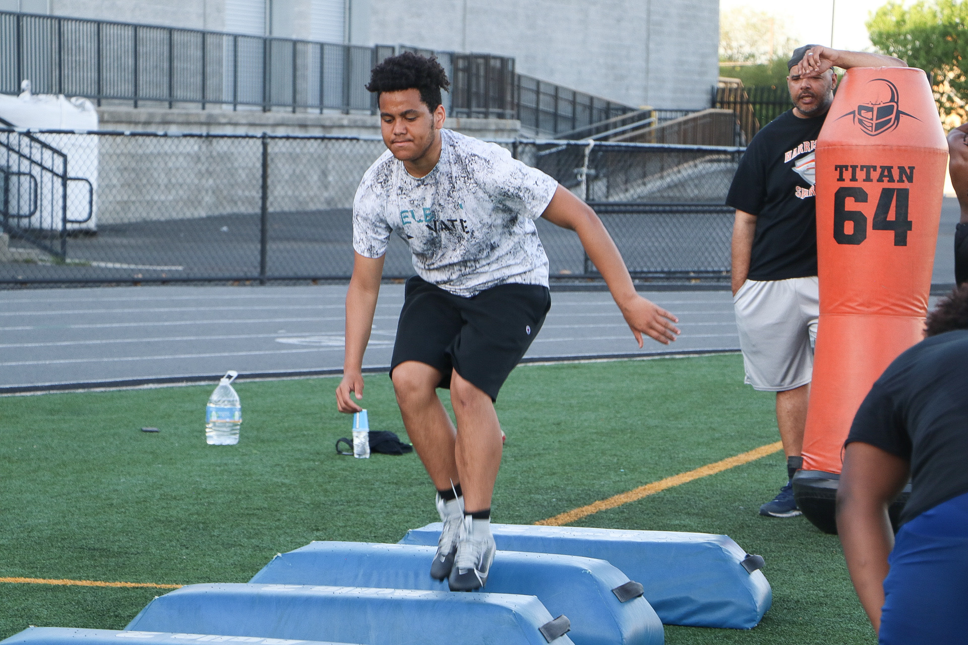 Harrisburg runs through drills during a football practice at Severance ...