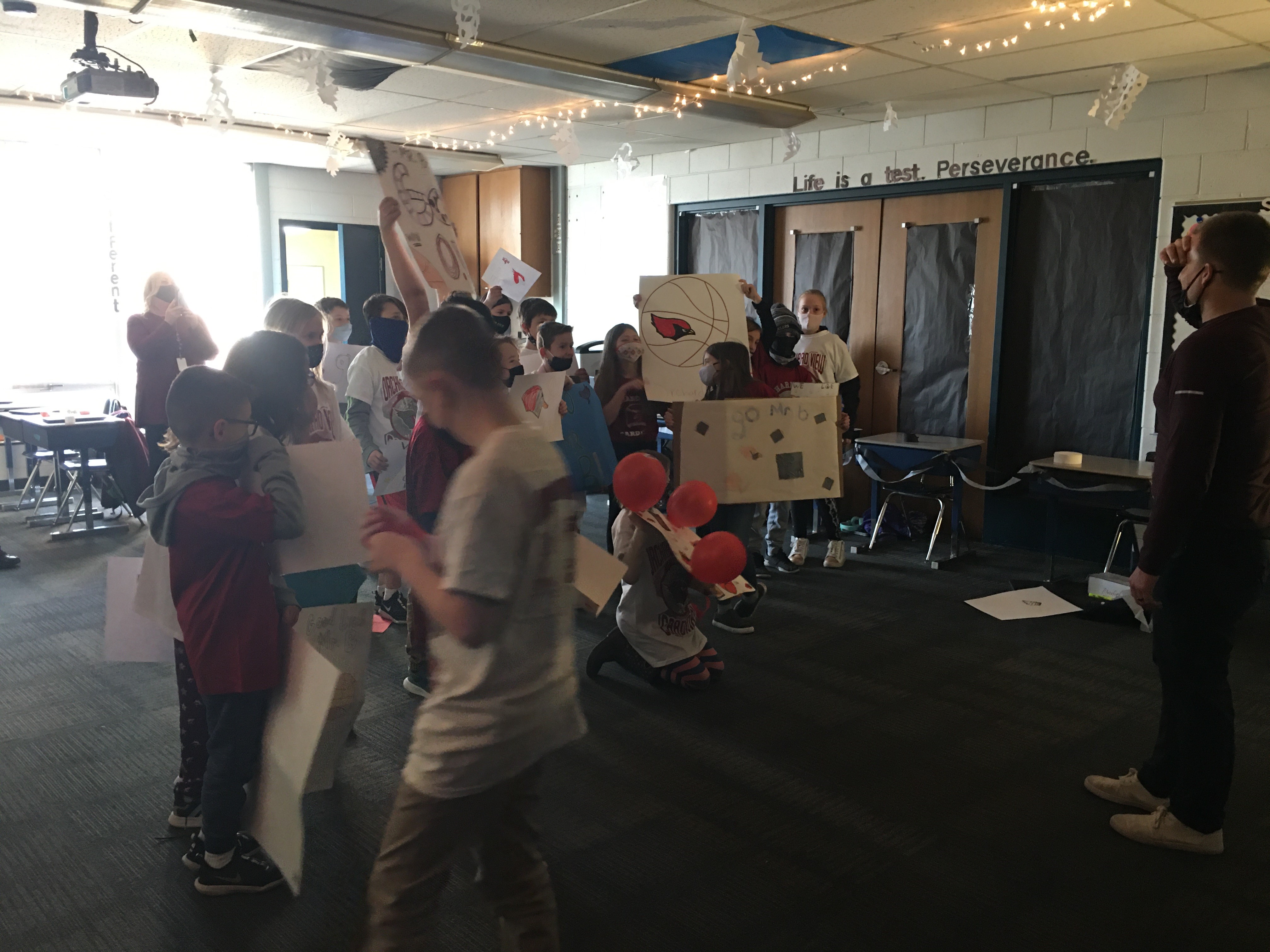 Nick Bronsema's fourth-grade class at Mona Shores' Ross Park surprises him with support of ...