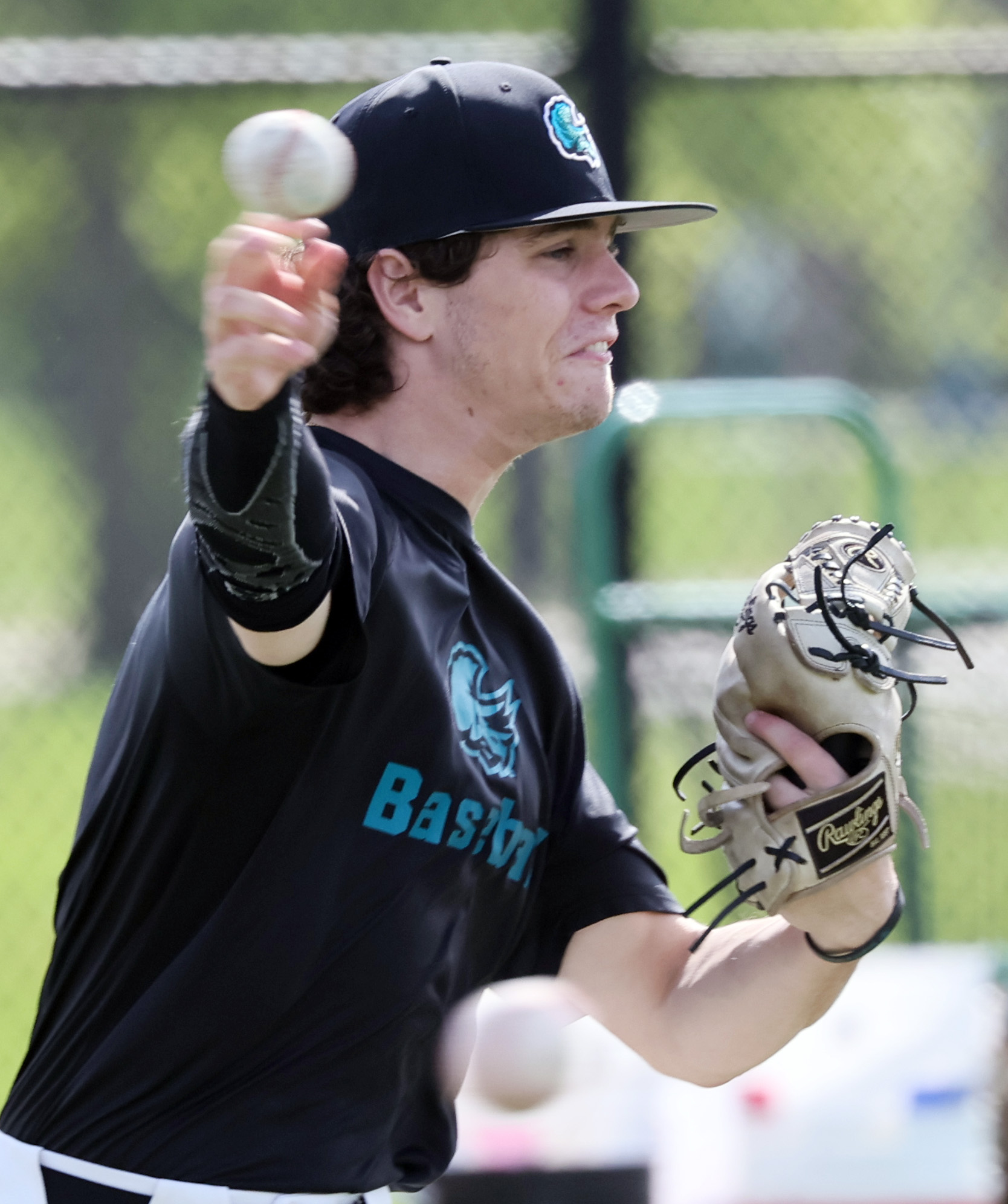 The Tri-C Triceratops baseball team practices before the start of their ...