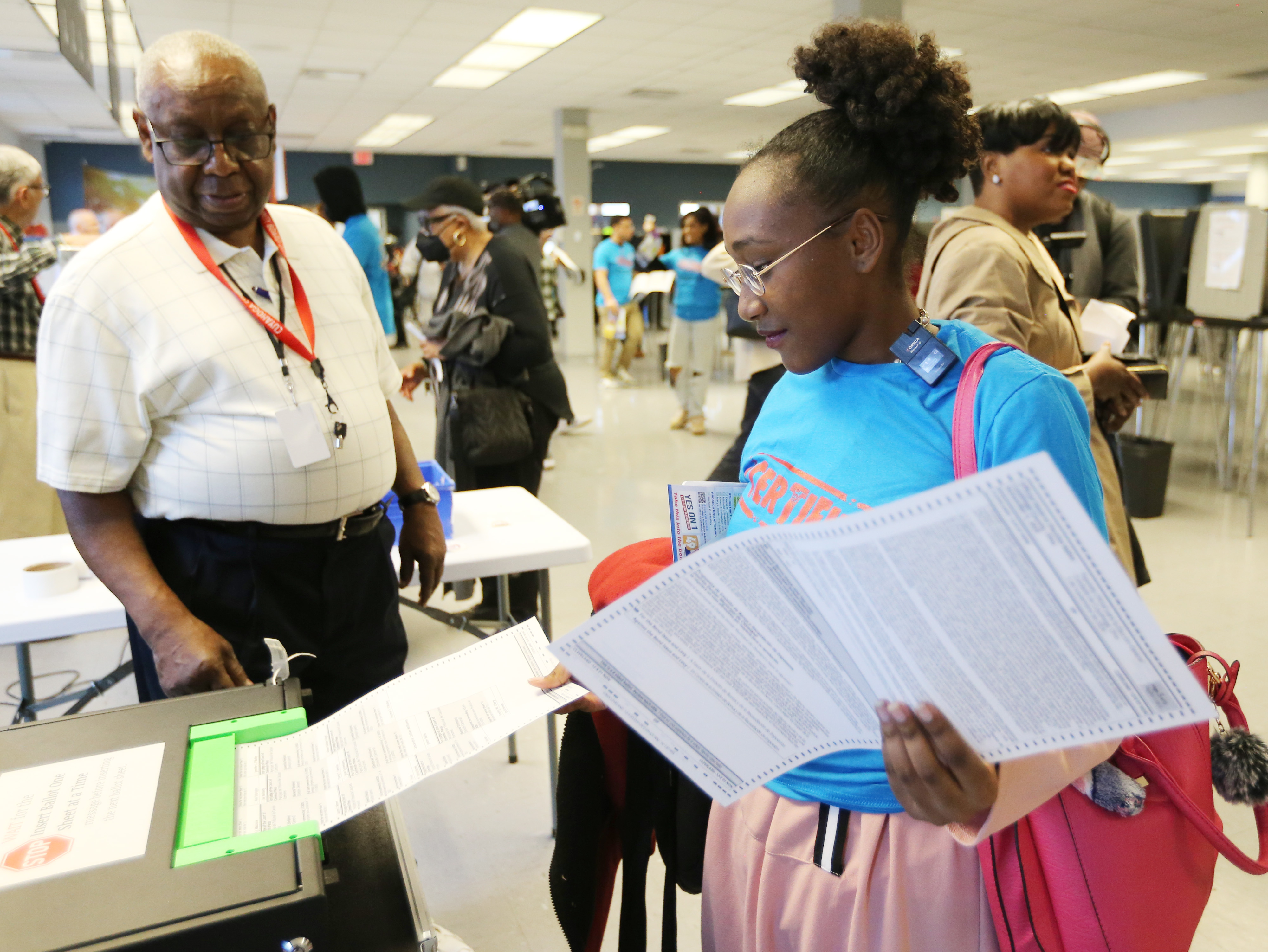 Newly eligible 18-year-old voters cast their first vote at the Cuyahoga ...