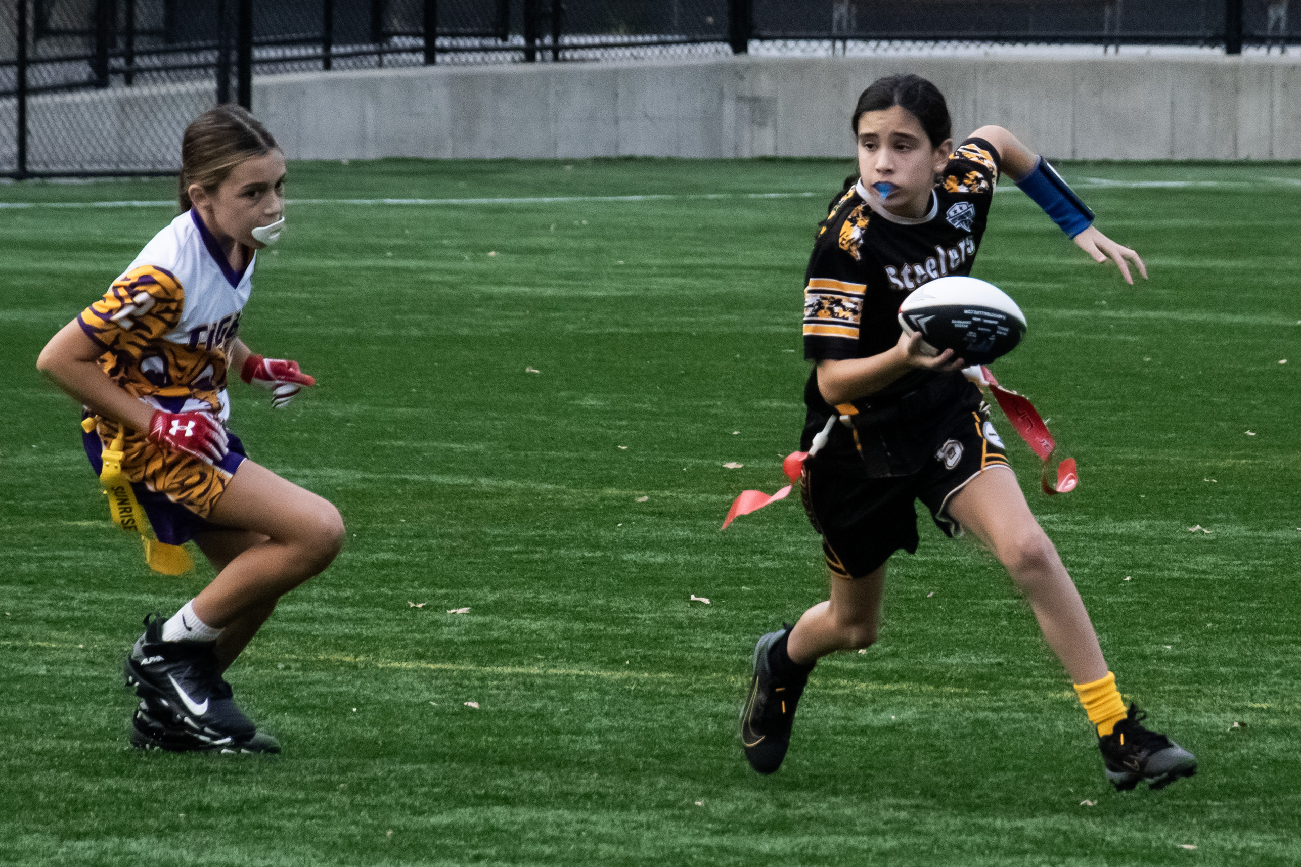 Next Level Flag Football players compete at the Berry Homes Wednesday ...