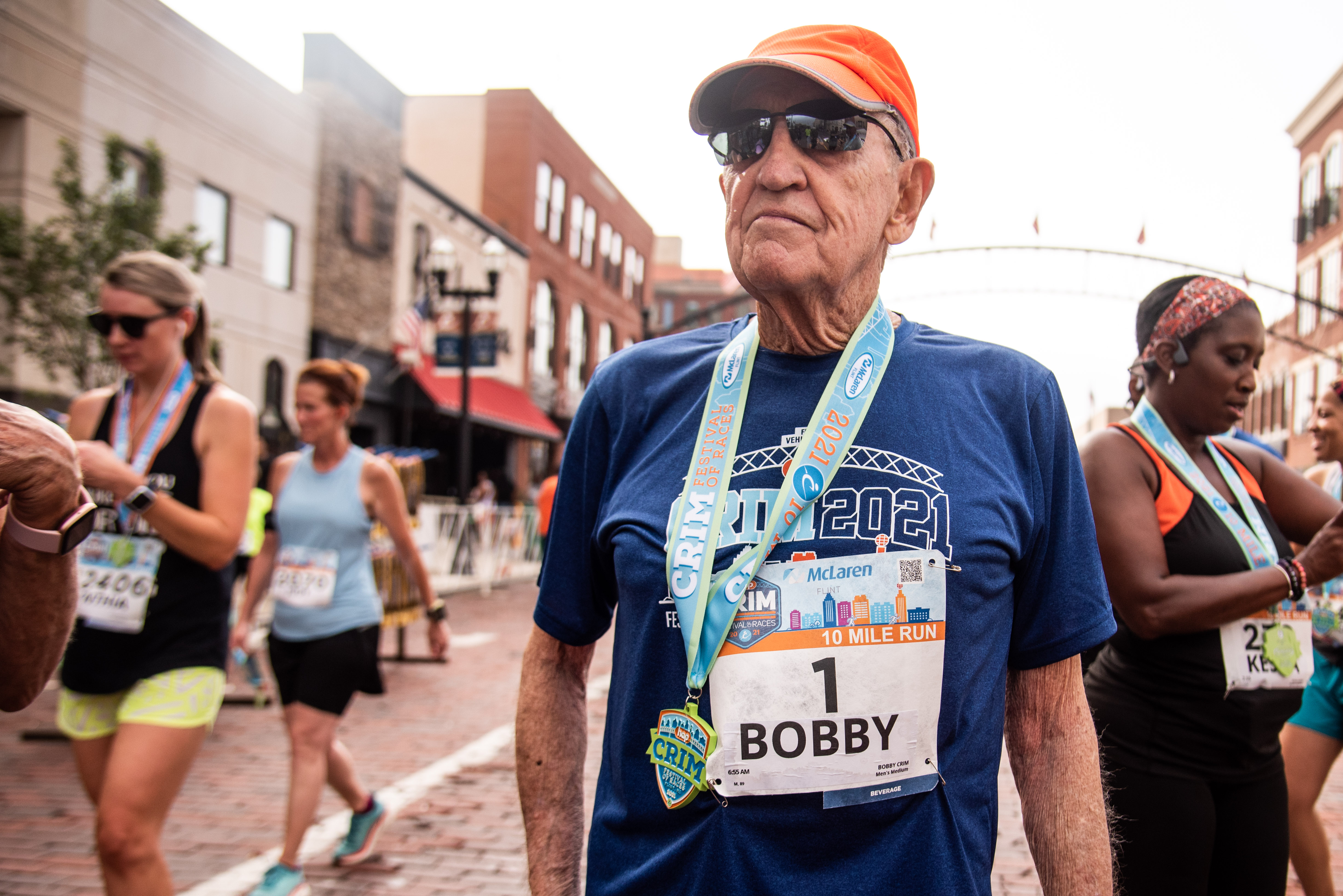 Founder Bobby Crim finishes 45th consecutive 10-mile race at HAP Crim ...