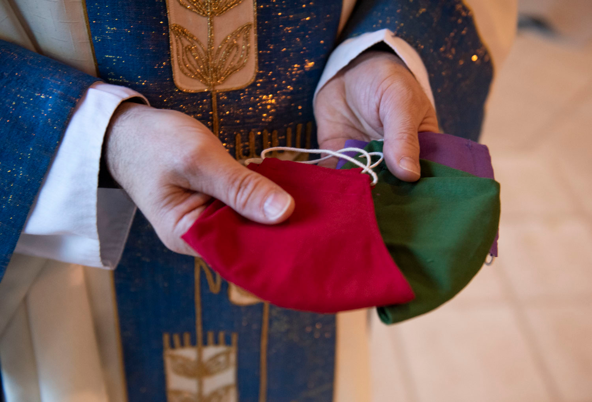 Ann Arbor priest wears a masks sewn by a parishioner to match his ...
