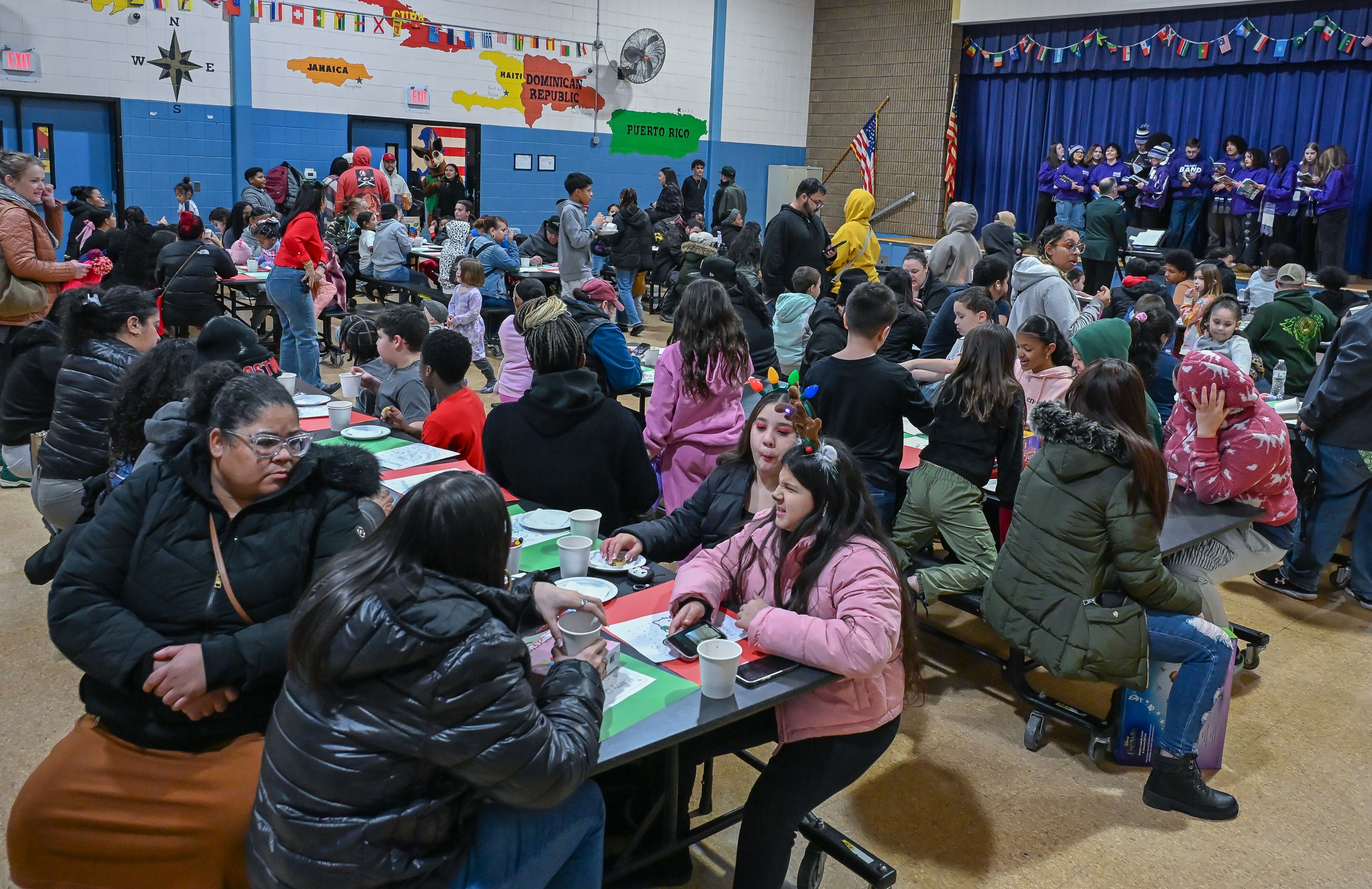 Students, families enjoy Cookies and Cocoa with Santa at Donahue School in Holyoke - masslive.com