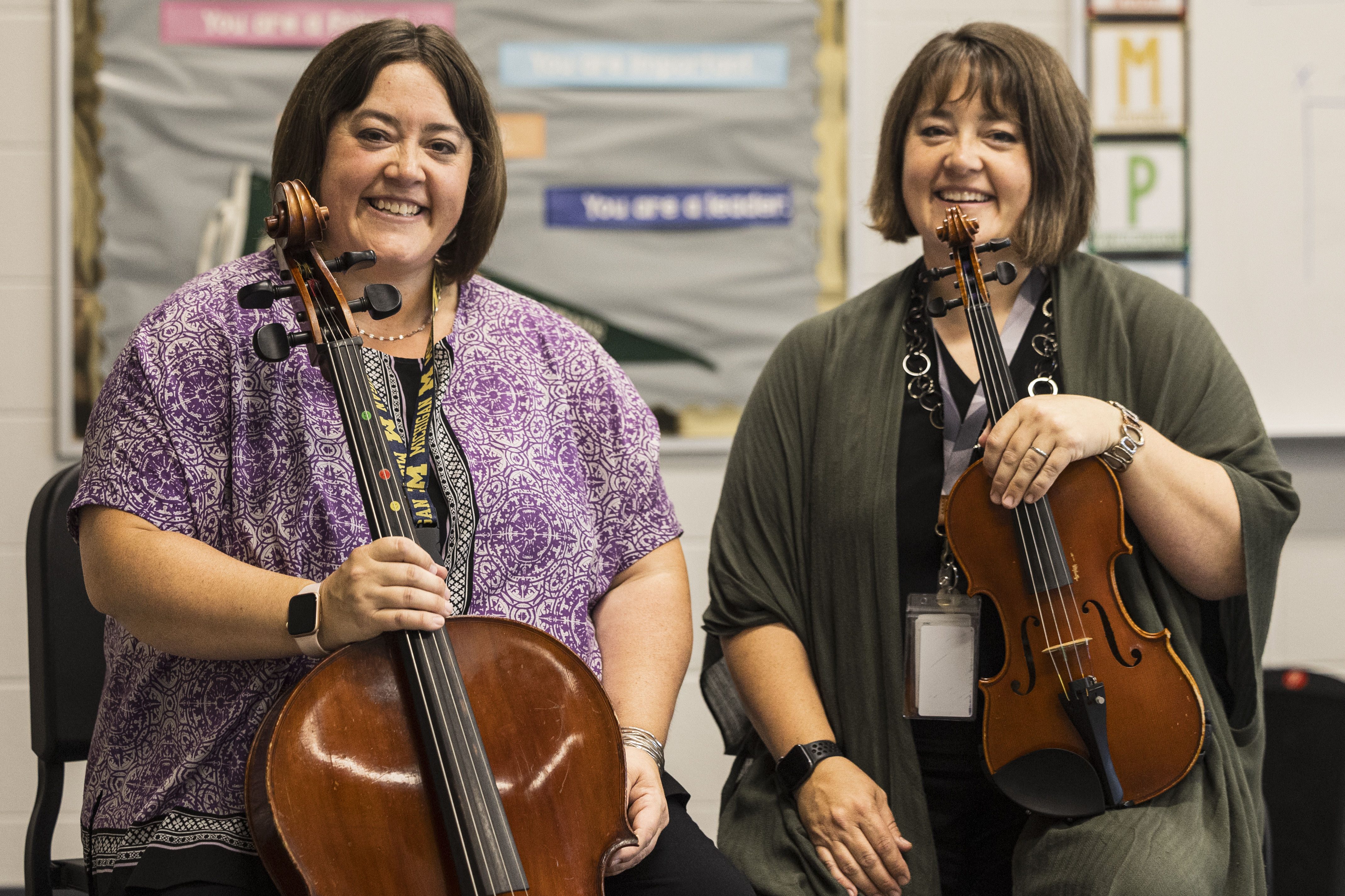 Identical twin sisters teach orchestra at Hudsonville Public Schools ...