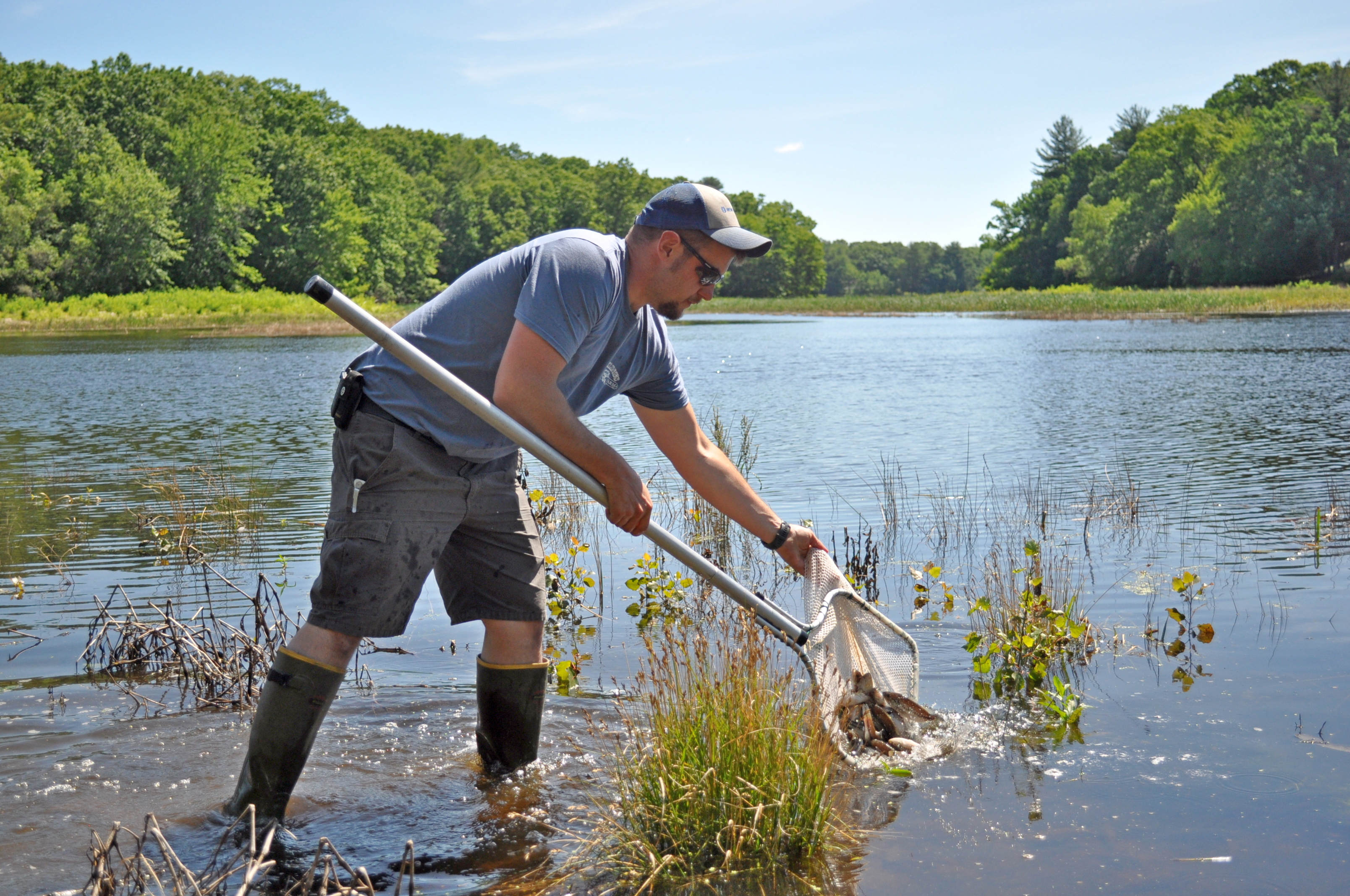 Man Fishing On Pond