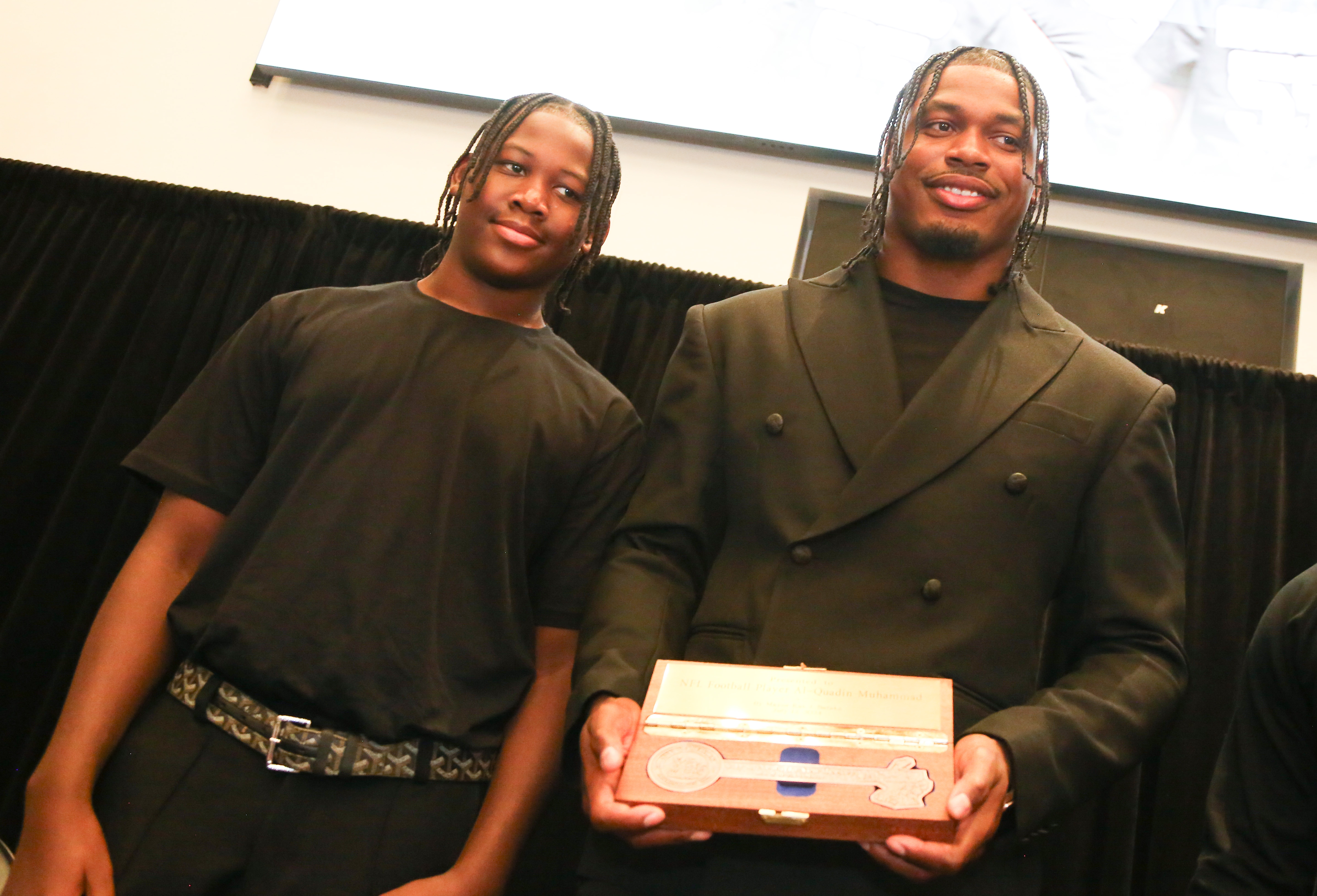 NFL player and Newark native Al-Quadin Muhammad is presented with a key ...