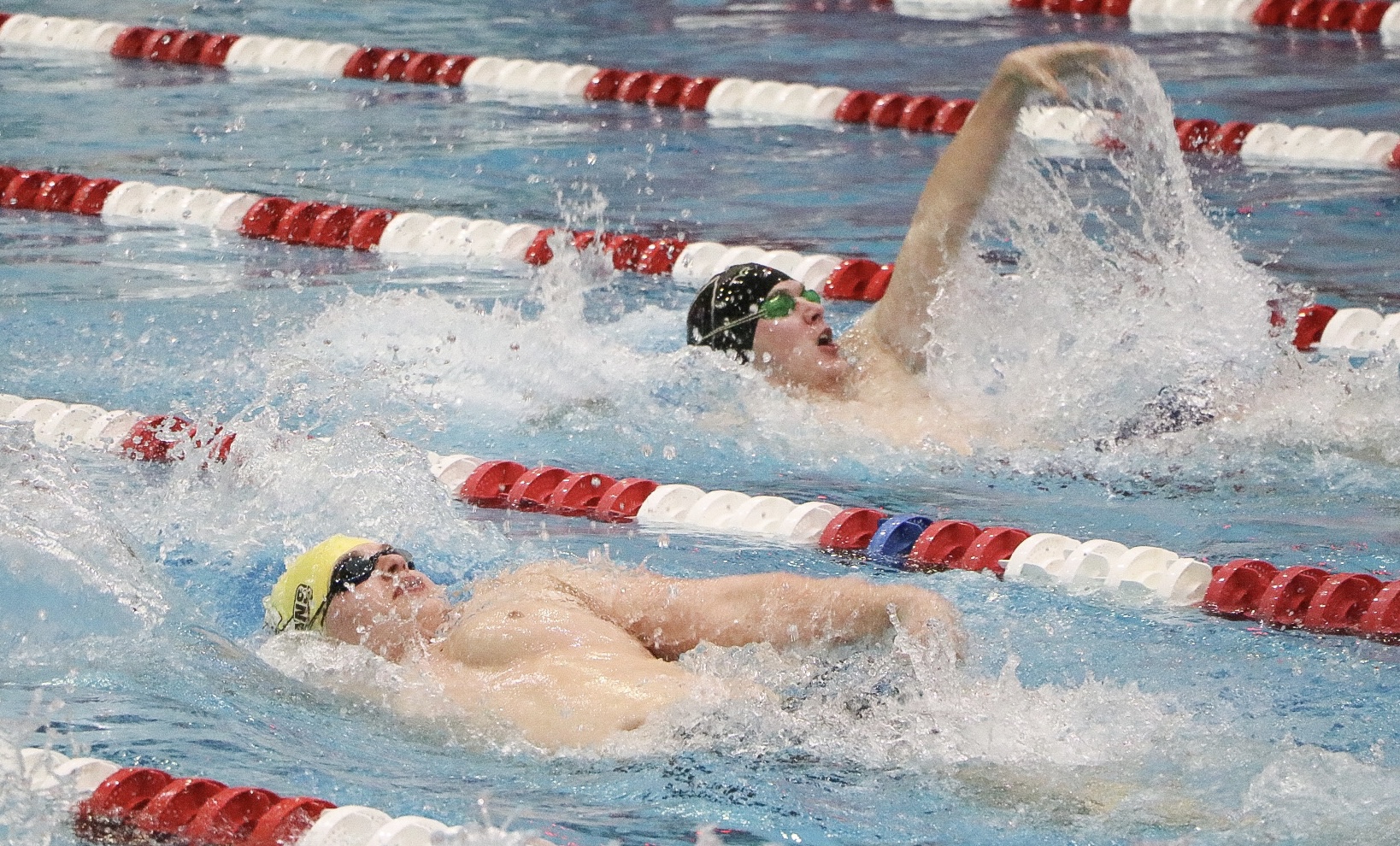 Boys compete in the Mid-Penn Conference swimming championships at ...