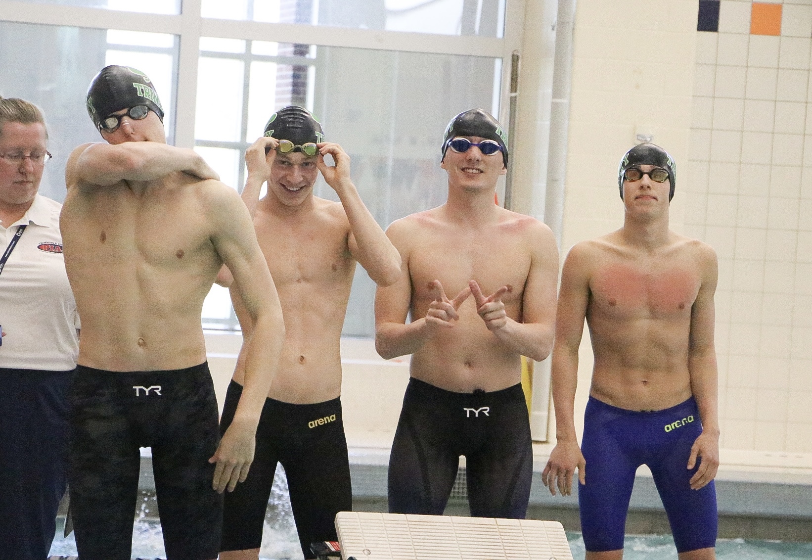 Trinity's boys team competes in the 200 medley relay during the PIAA ...