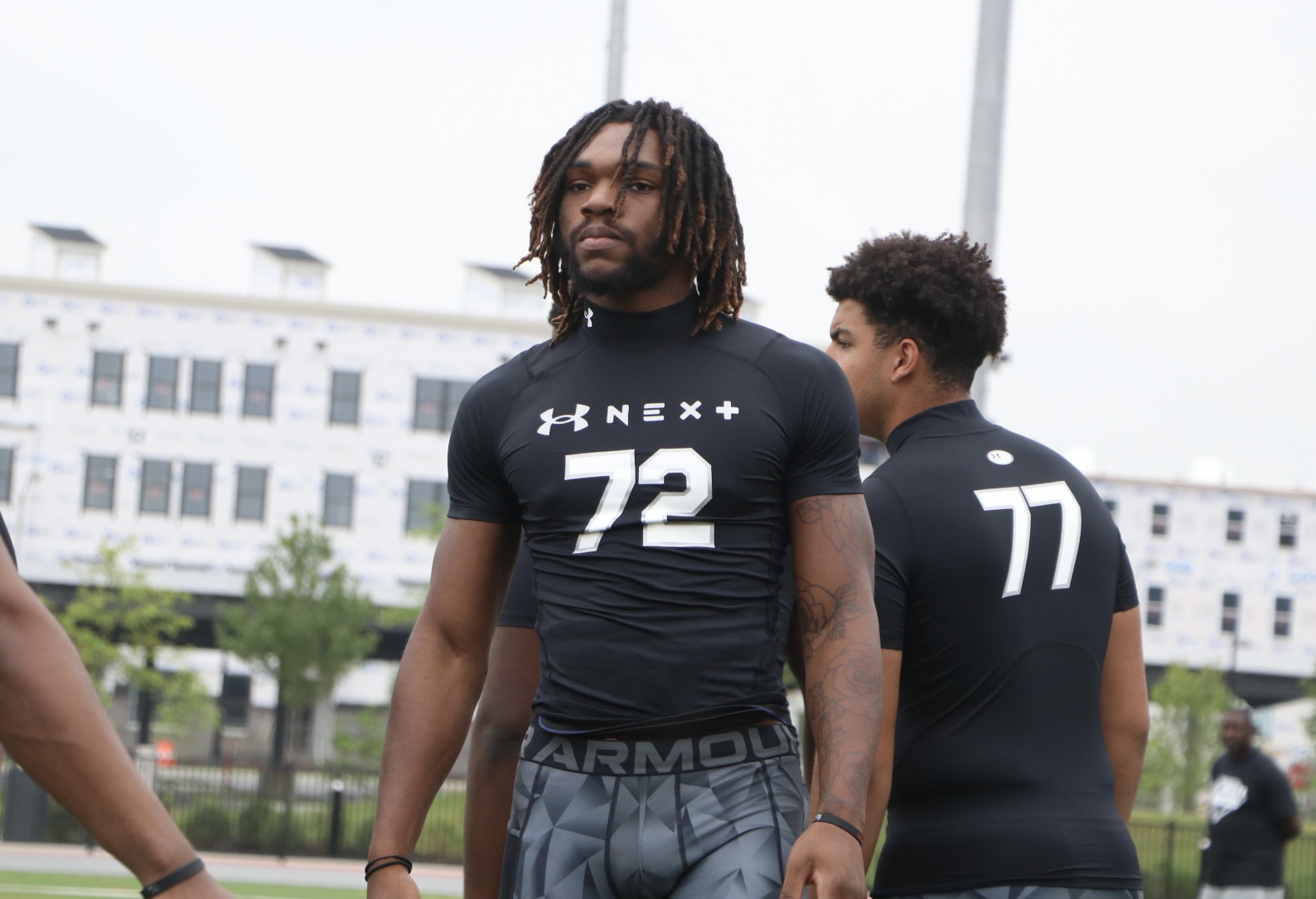 Imhotep Charter defensive end Zahir Mathis runs through drills during ...