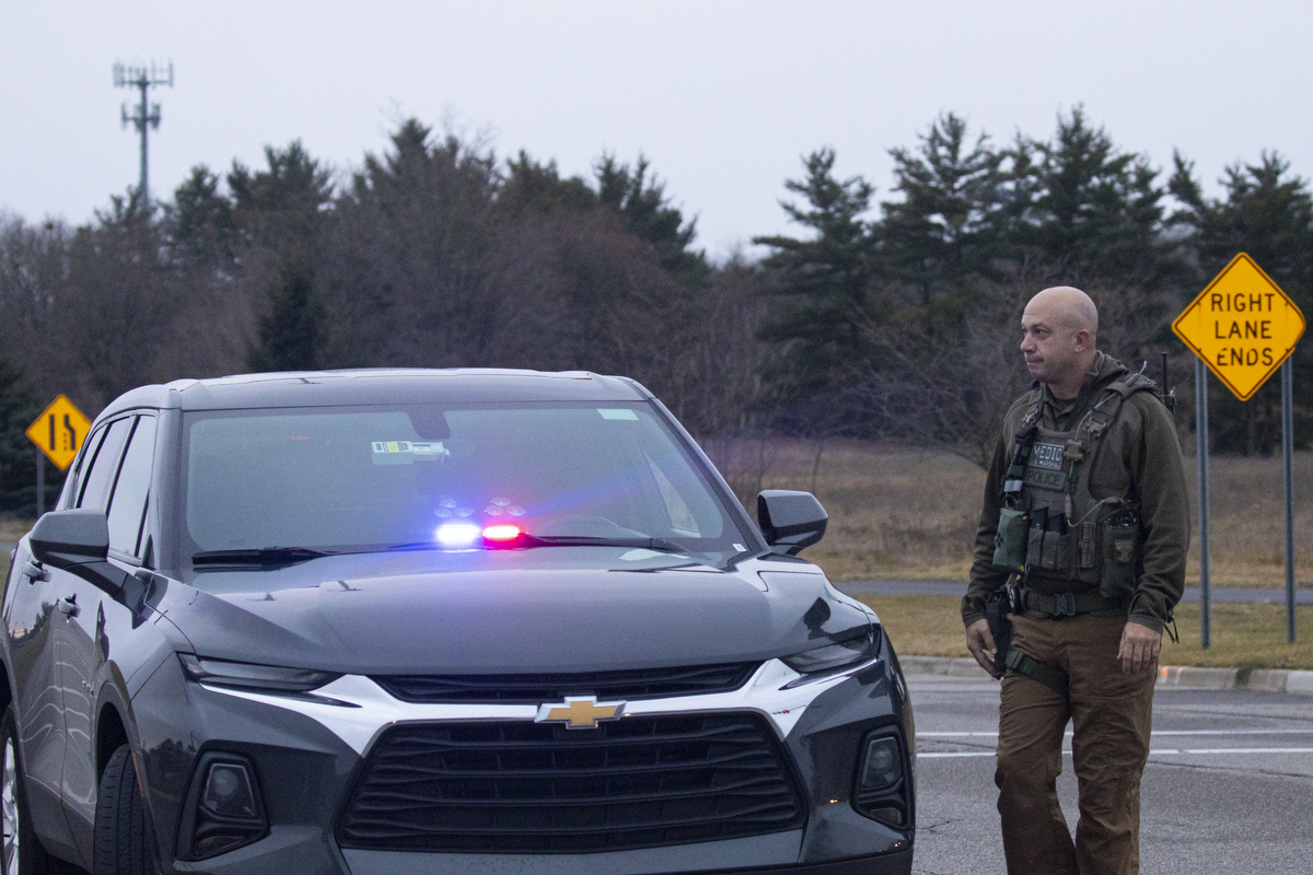 Trucks carrying COVID-19 vaccine depart Pfizer plant in Portage ...