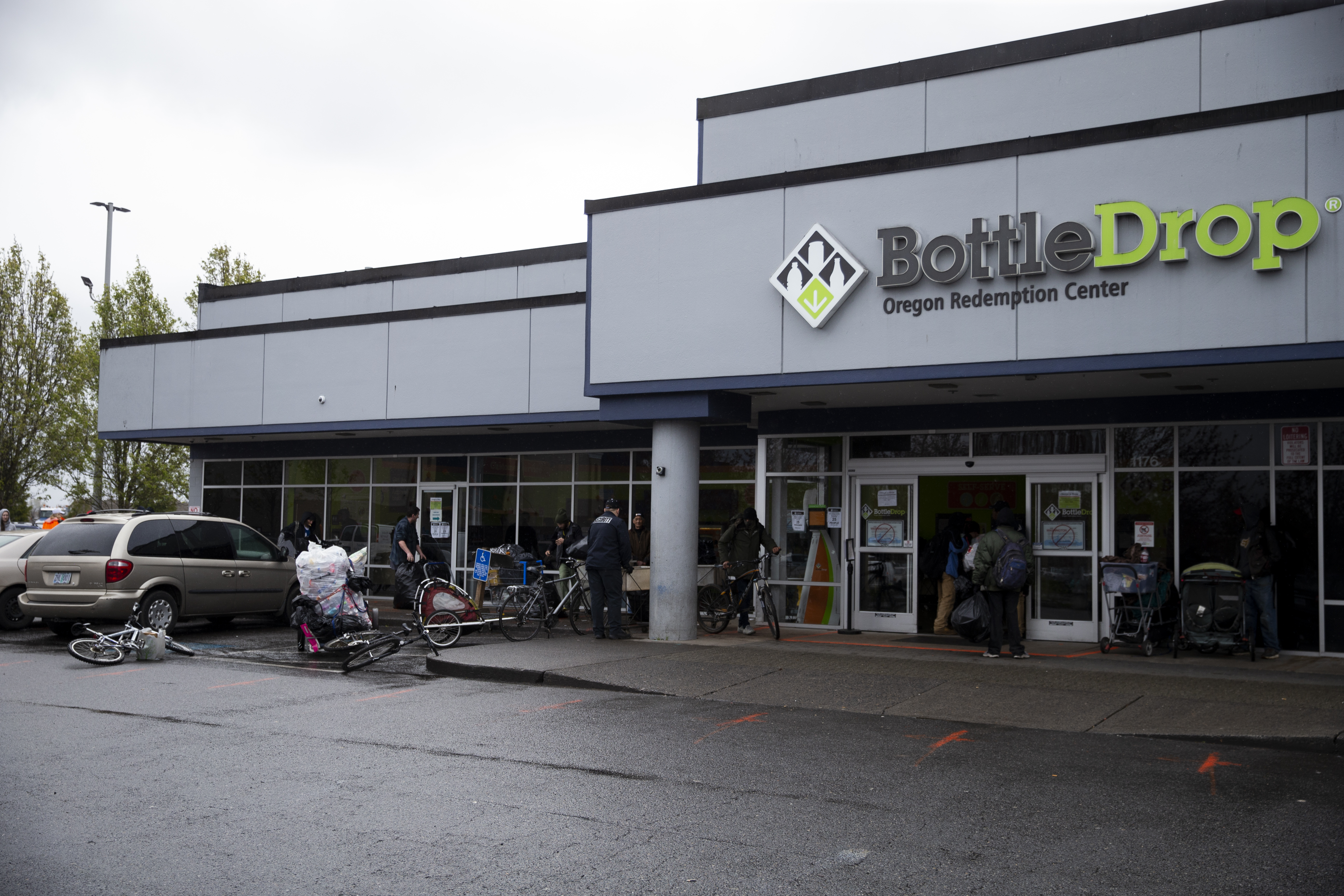 People return containers to BottleDrop Redemption Center - oregonlive.com