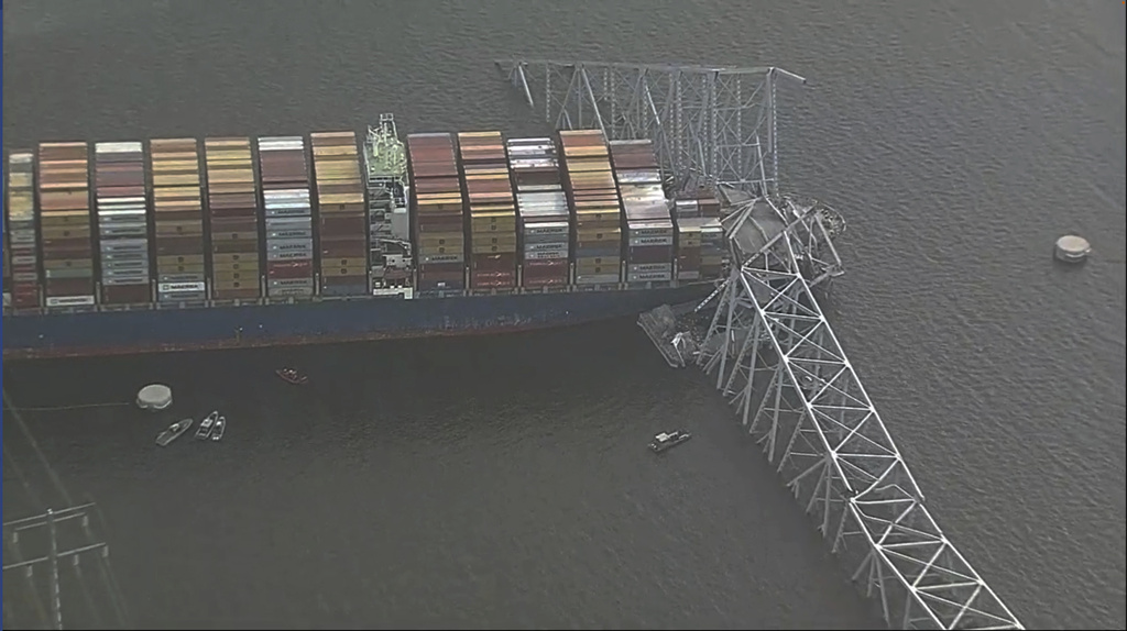 Baltimore bridge collapses after powerless cargo ship rams into support ...