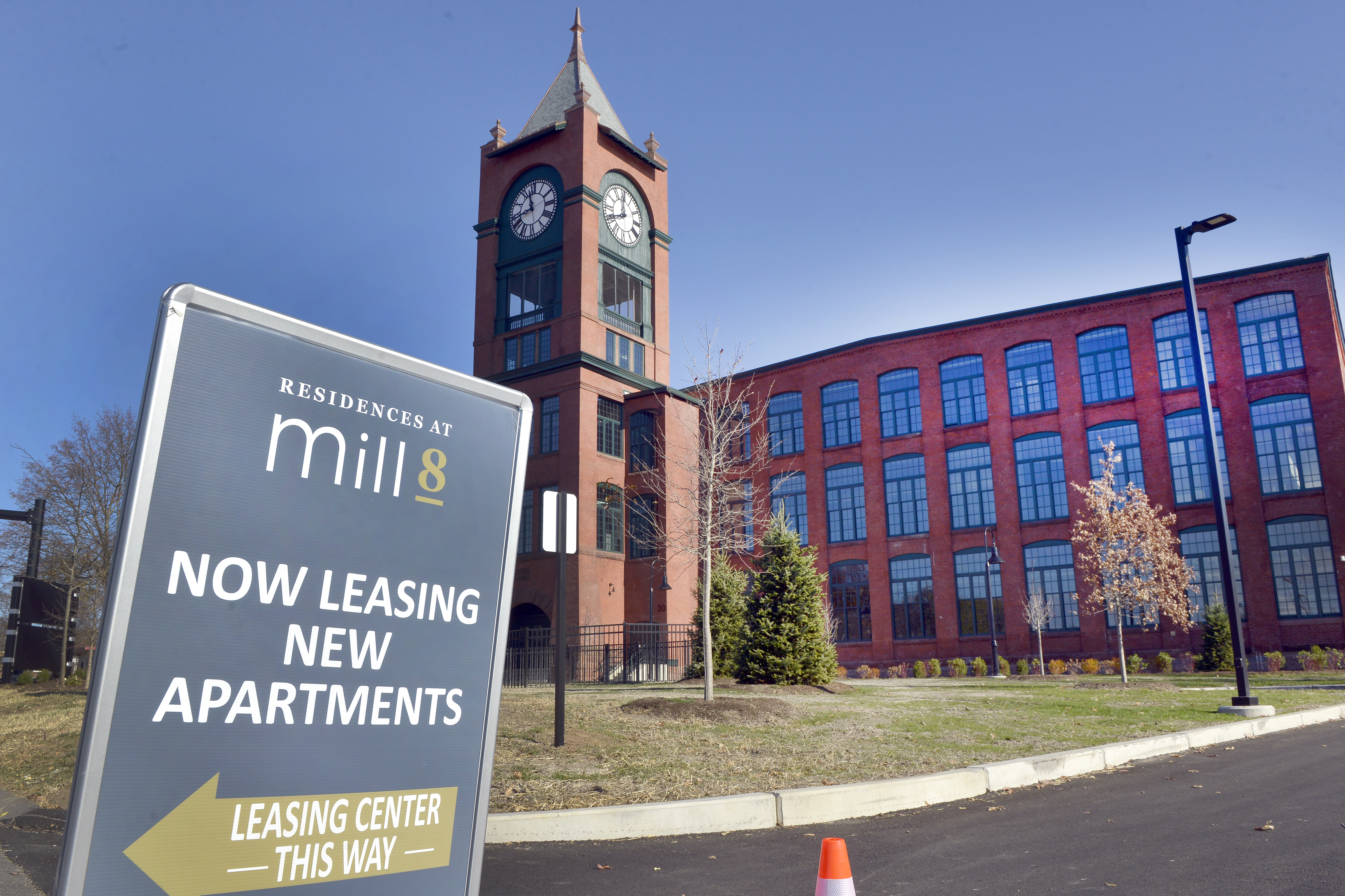 Officials applaud opening of Mill 8 housing at Ludlow Mills - masslive.com