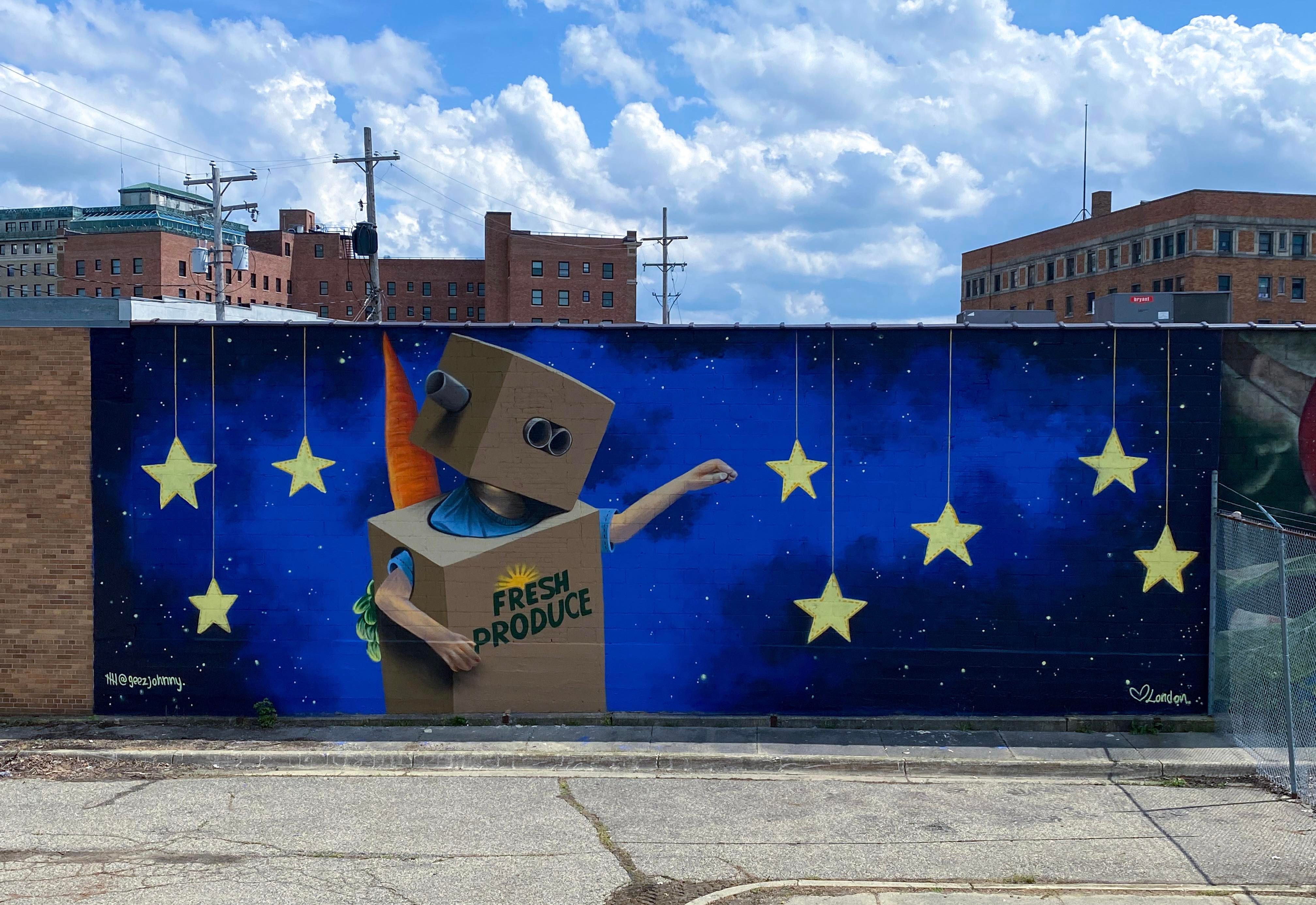 Flint artist Johnny Fletcher adds pop of color at UM-Flint with newest downtown mural - mlive.com