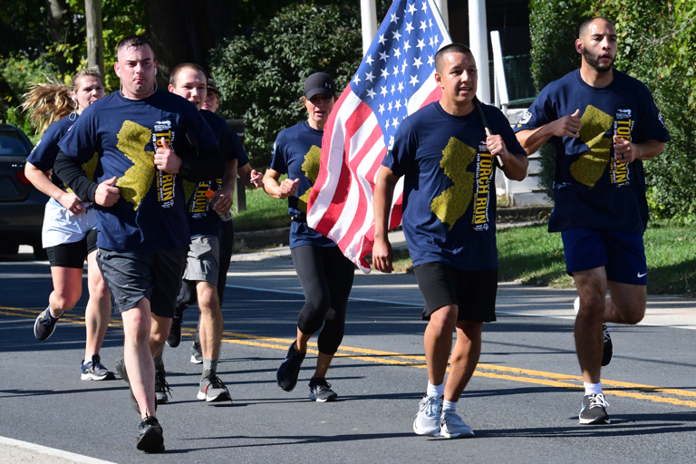Warren County police hit the streets in Torch Run to benefit Special ...