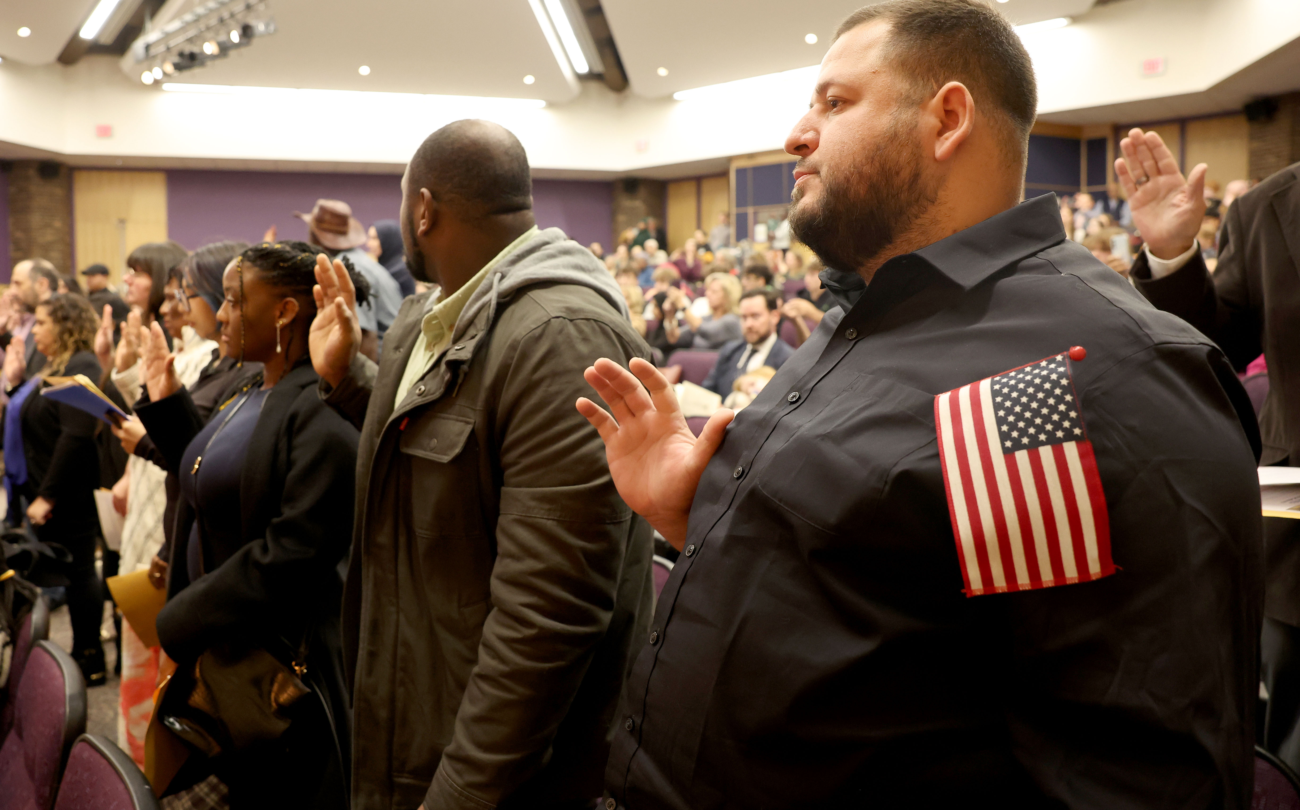 Eighty new citizens welcomed at OCC ceremony - syracuse.com