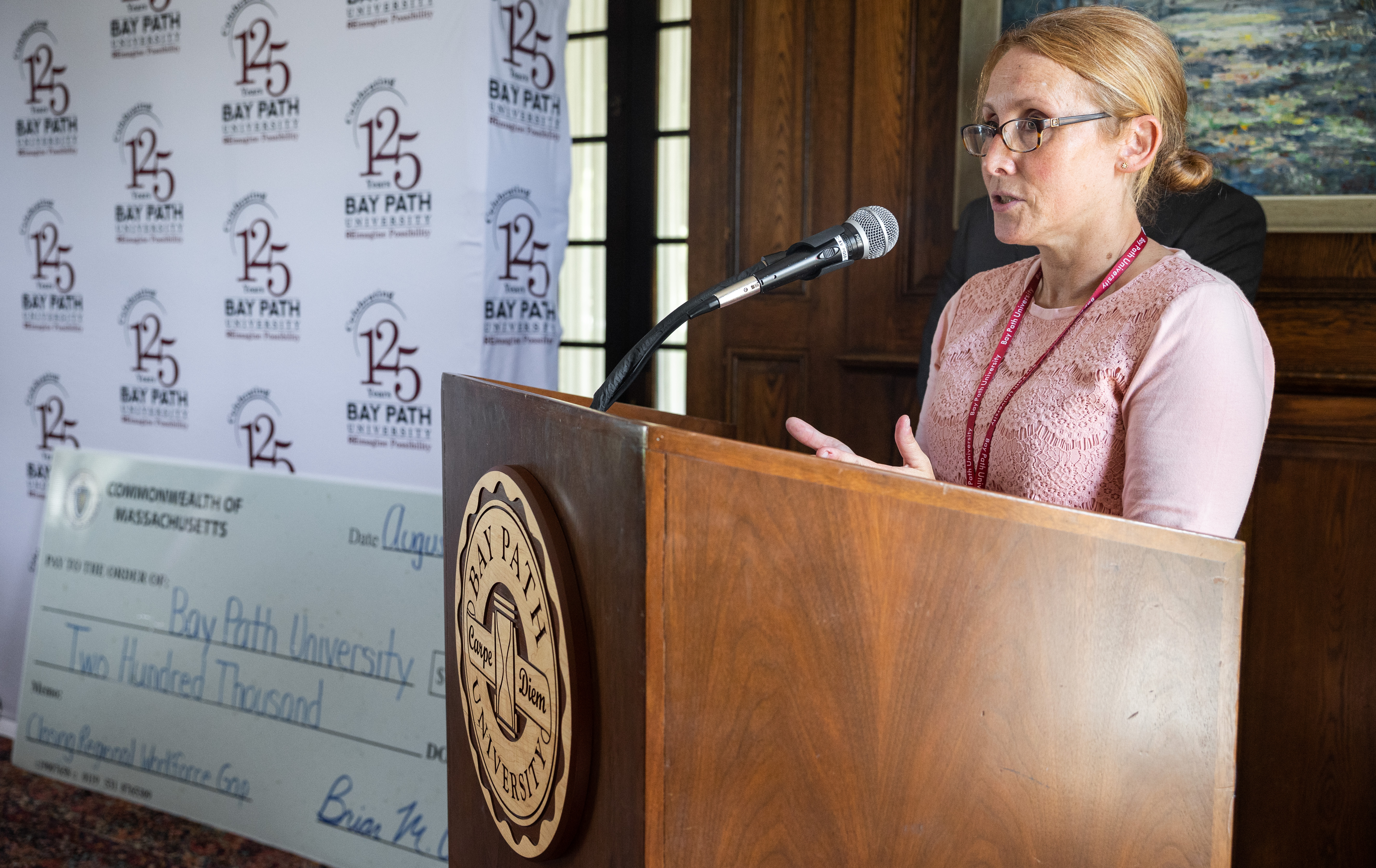 State rep. Brian M. Ashe and Bay Path University president Sandra Doran ...